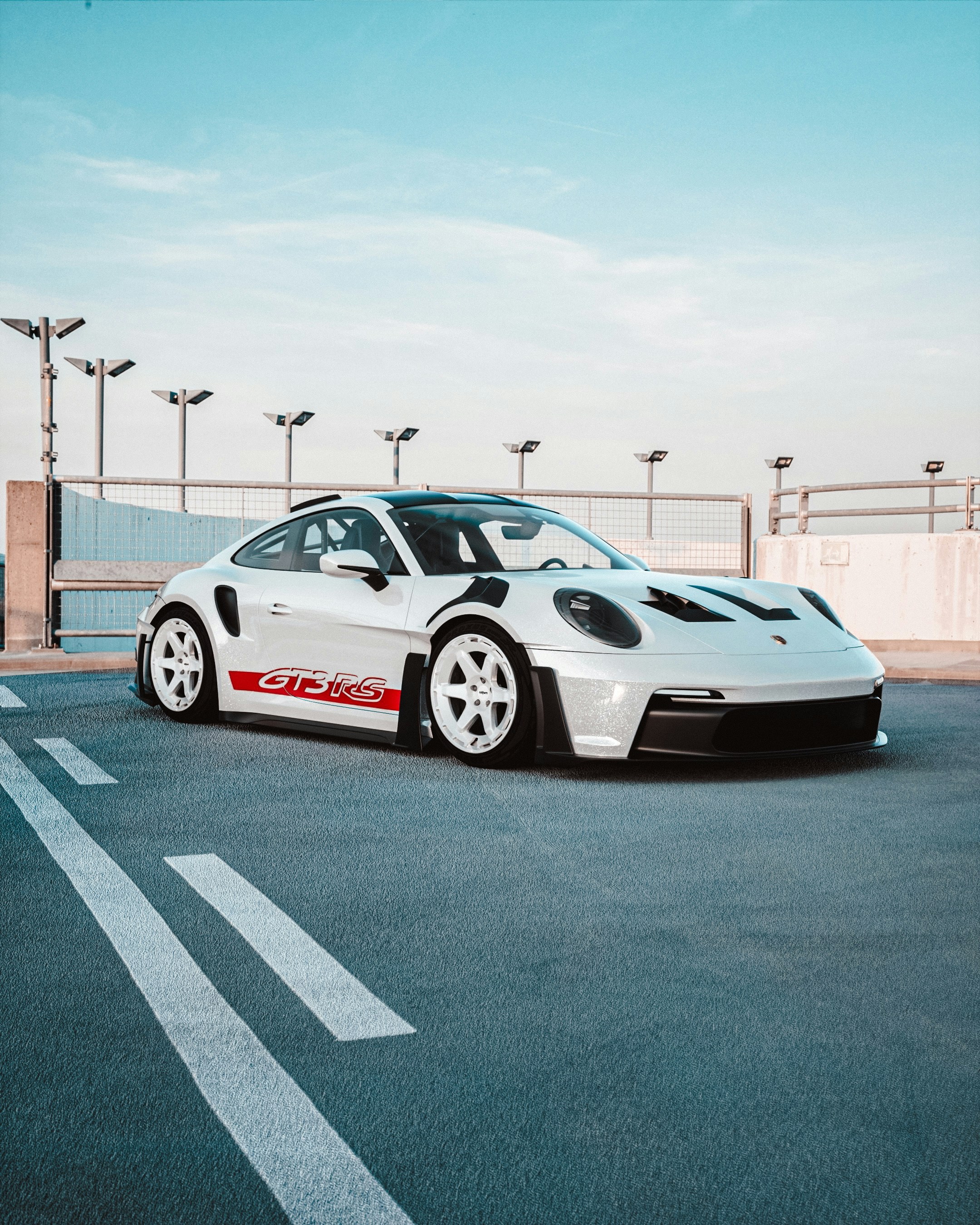 A white porsche 911 gt3 rs parked. photo – Free Digital image Image on ...