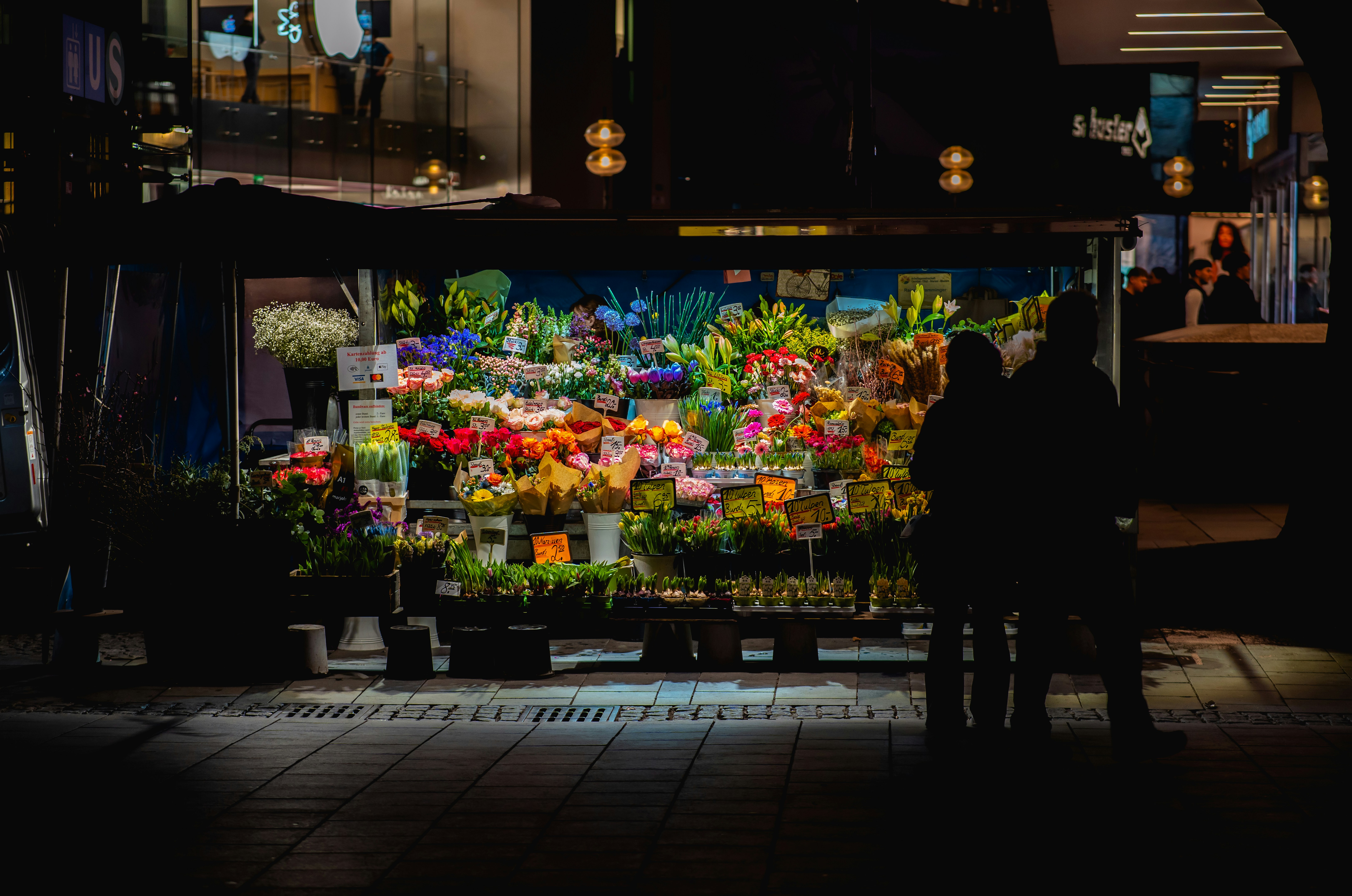 Neon Bloom at Night: A Flower Stall in the City Glow
