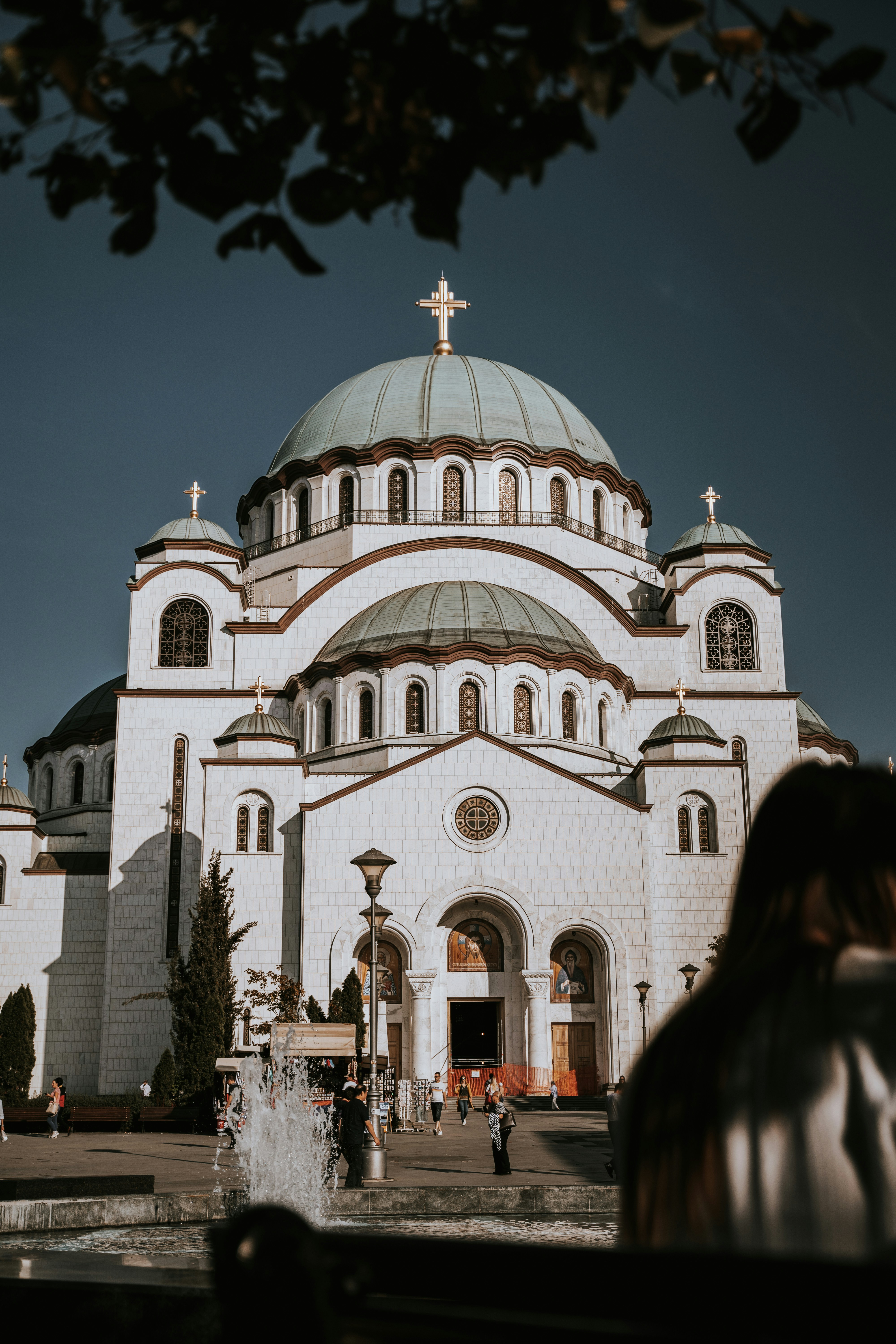 Domed Grace: A Sunlit Orthodox Cathedral Rising Over a Quiet Square