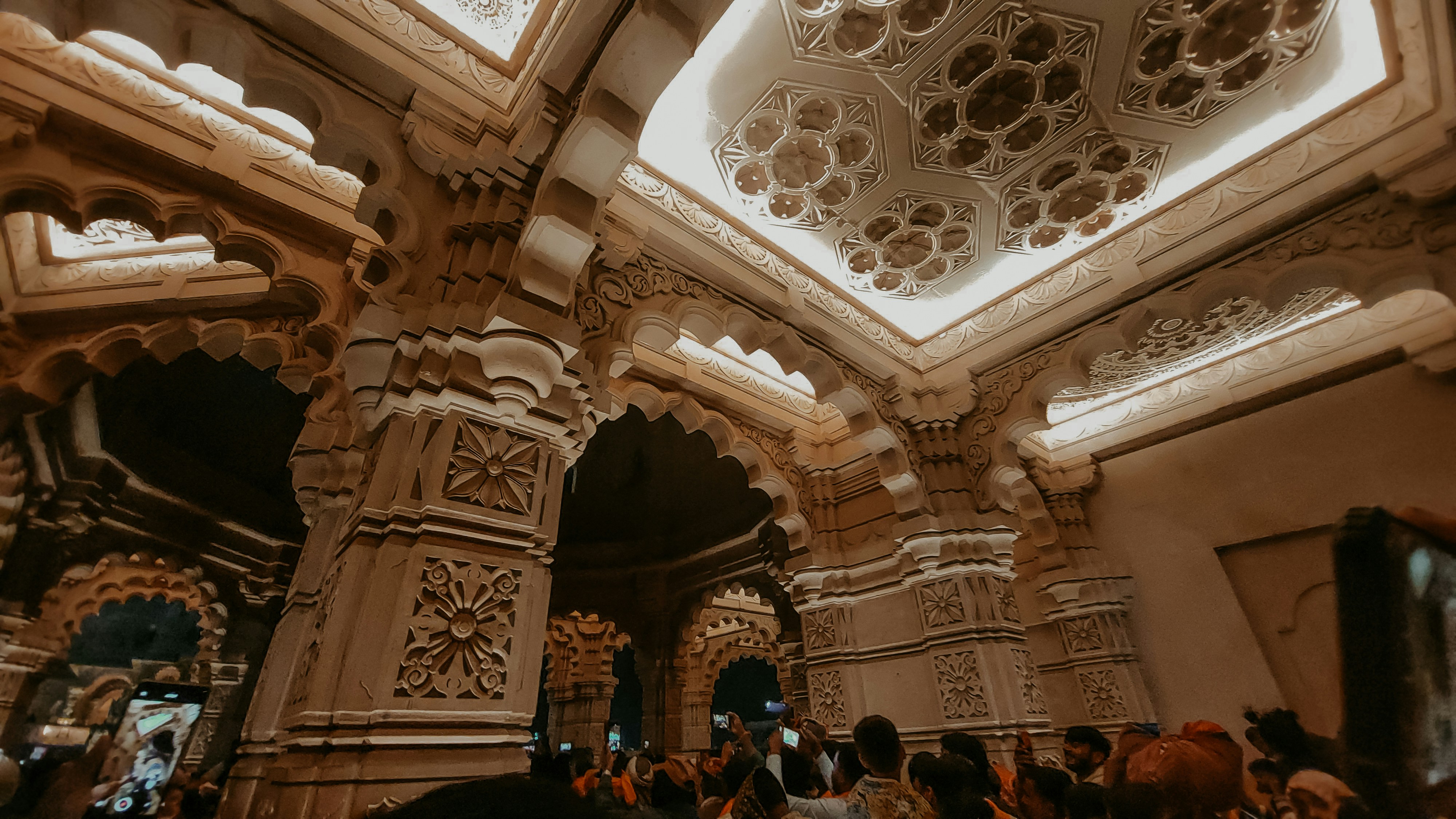 Sepia-lit Arches: A Corridor of Carved Stone and Quiet Glow