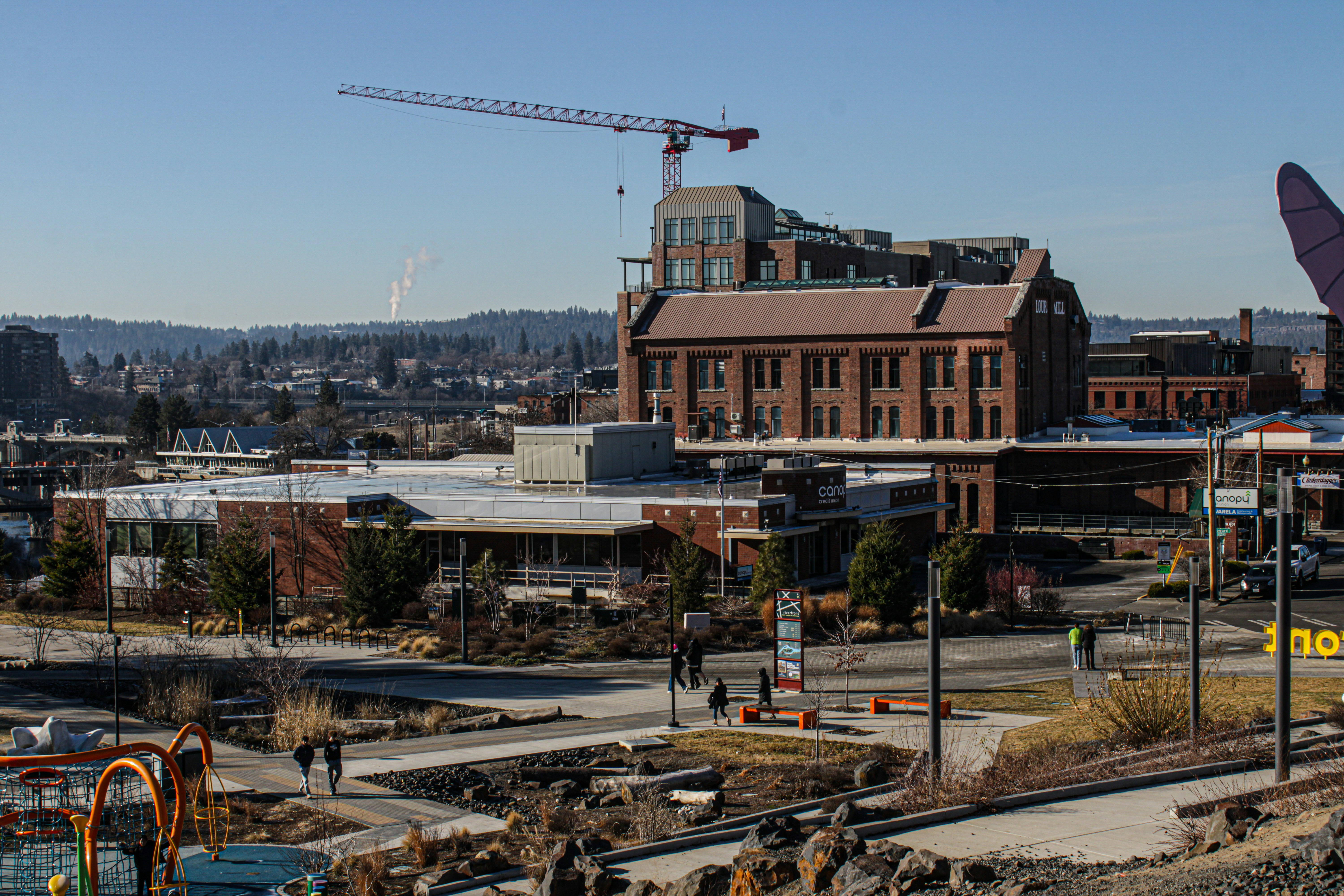 Crane Over the Brick Complex: Urban Renewal in Daylight
