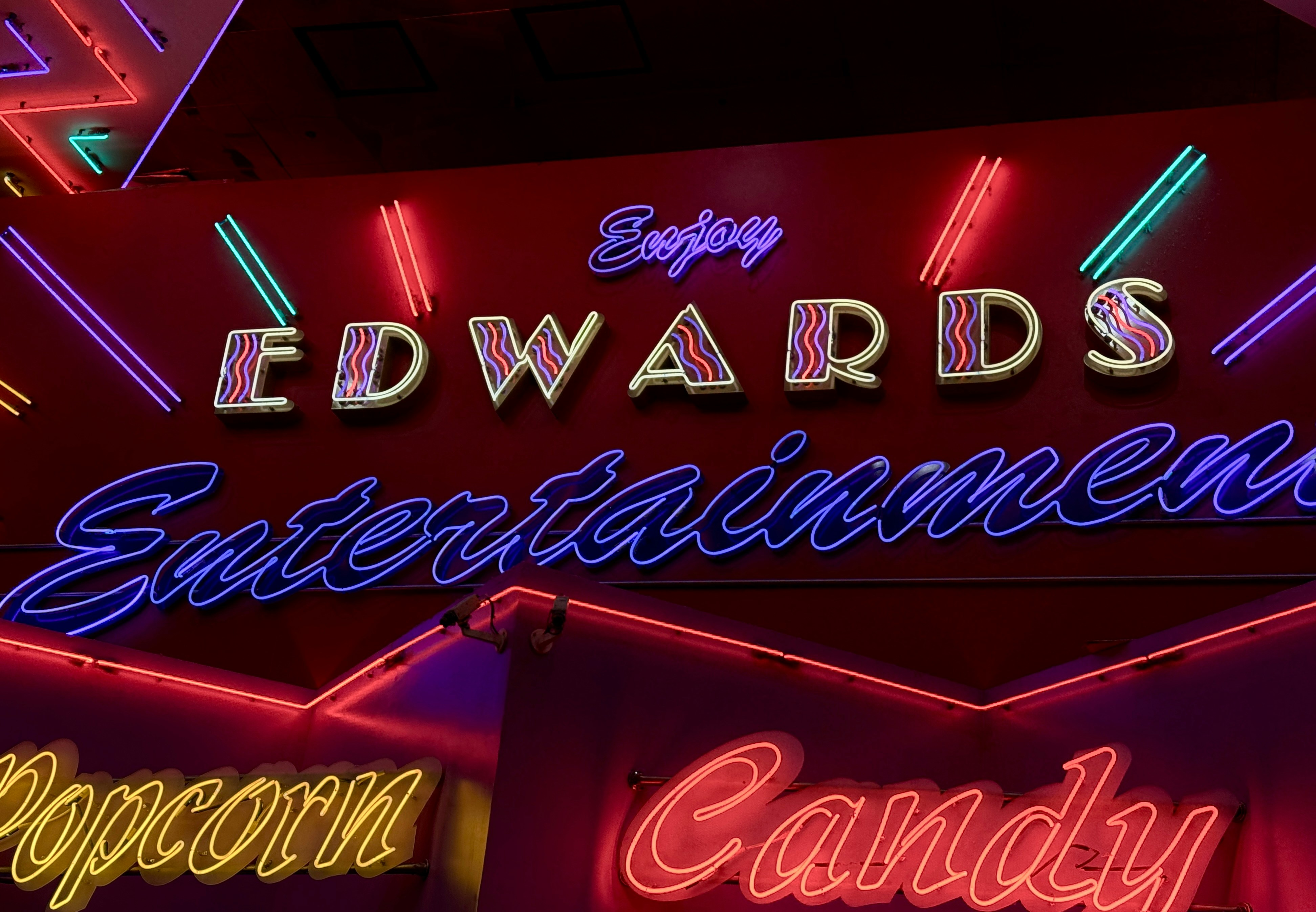 Edwards entertainment signage is glowing in neon lights. photo – Free ...