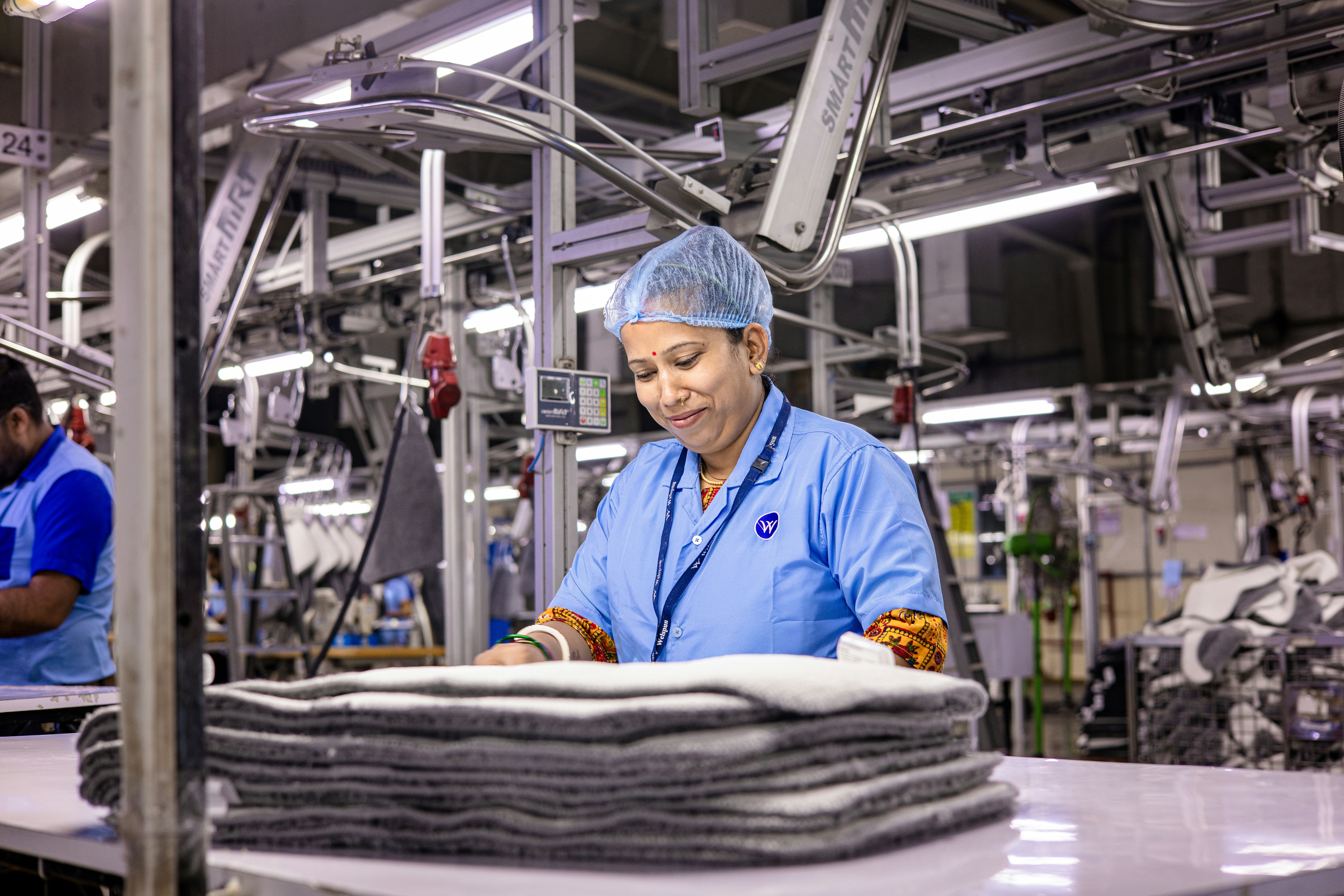 Woman working at a clothing factory. photo – Free Worker Image on Unsplash