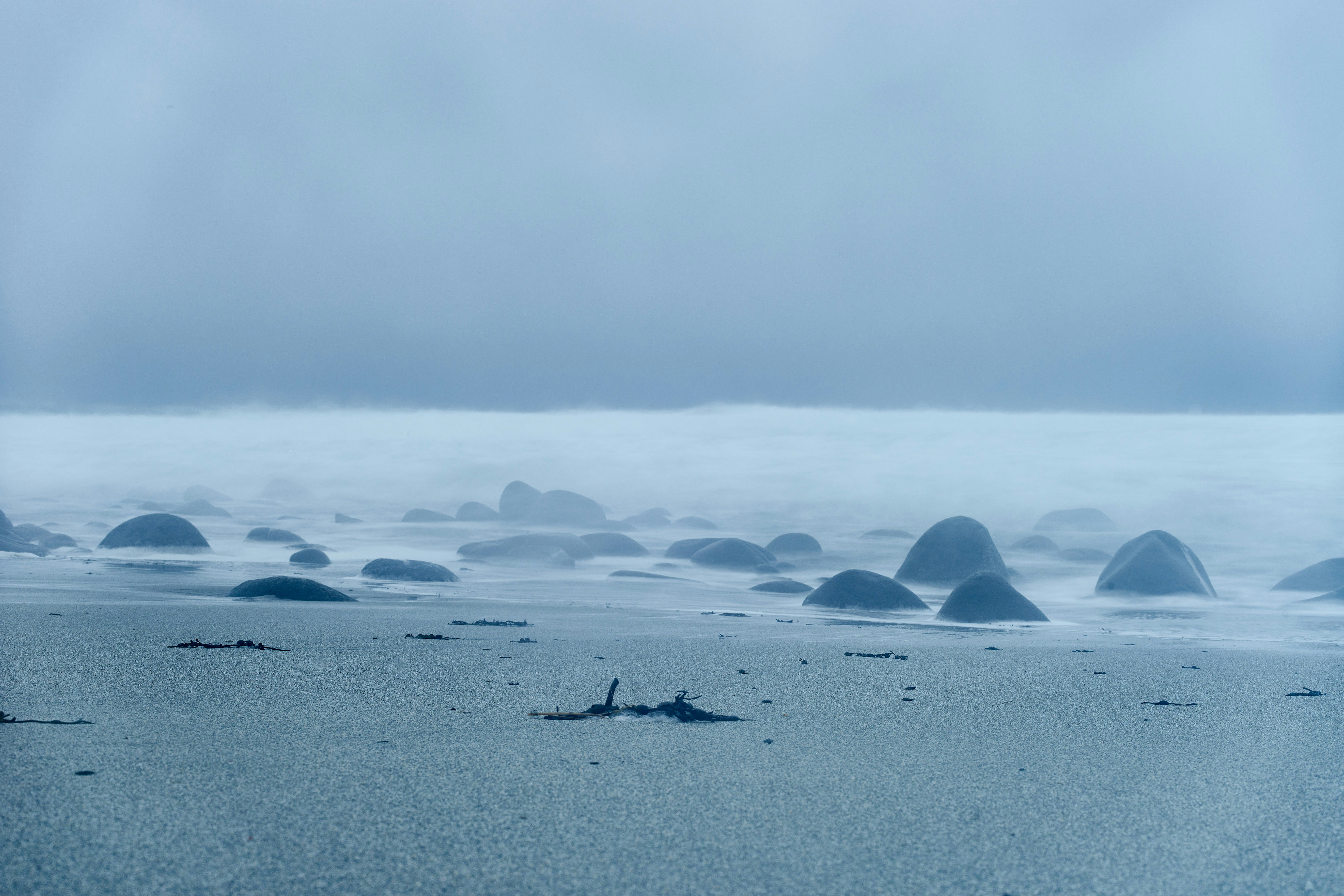 Rocks and water in a misty, overcast environment. photo – Free Beach ...