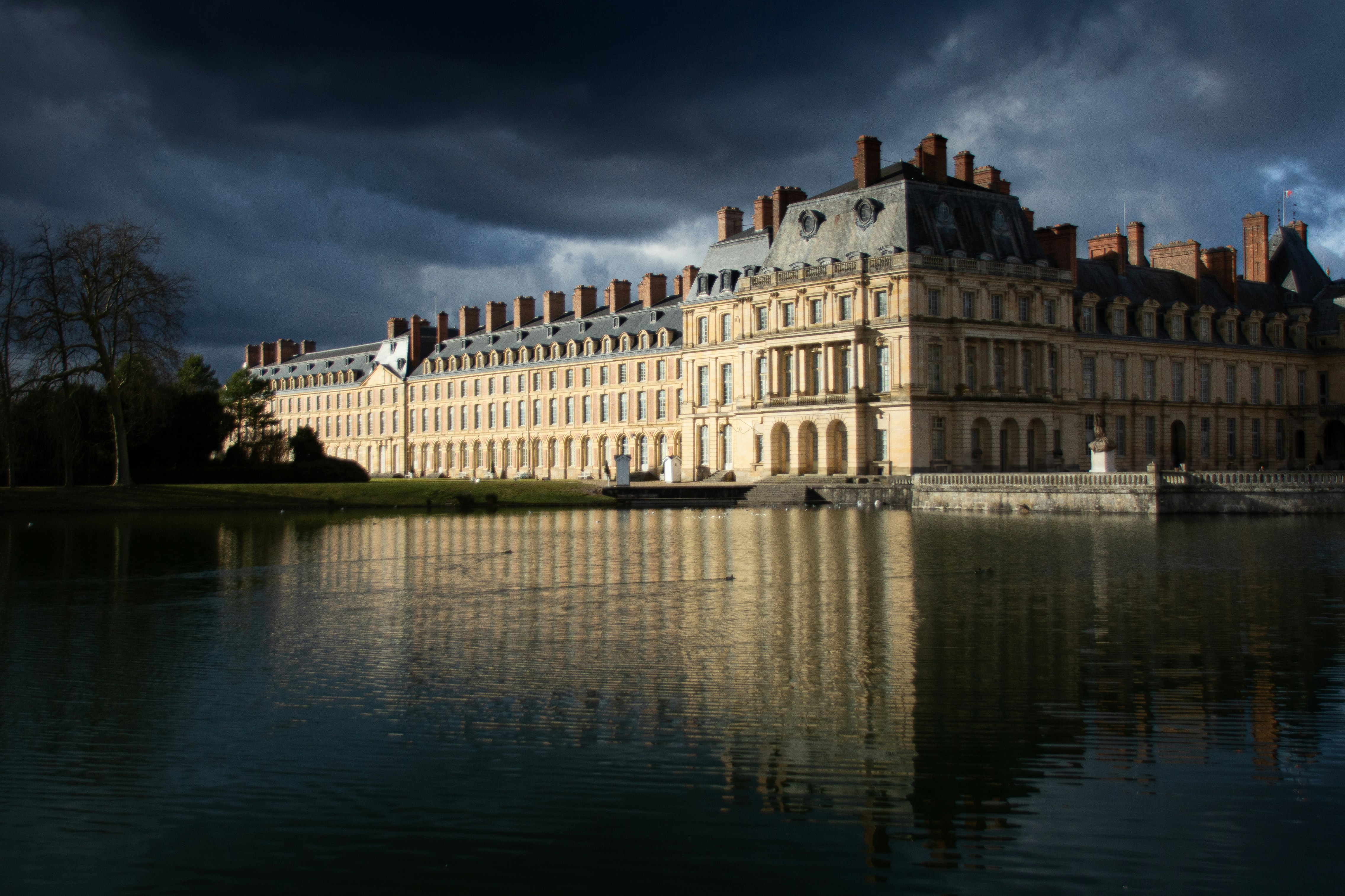 Majestic Reflection Under Brooding Skies