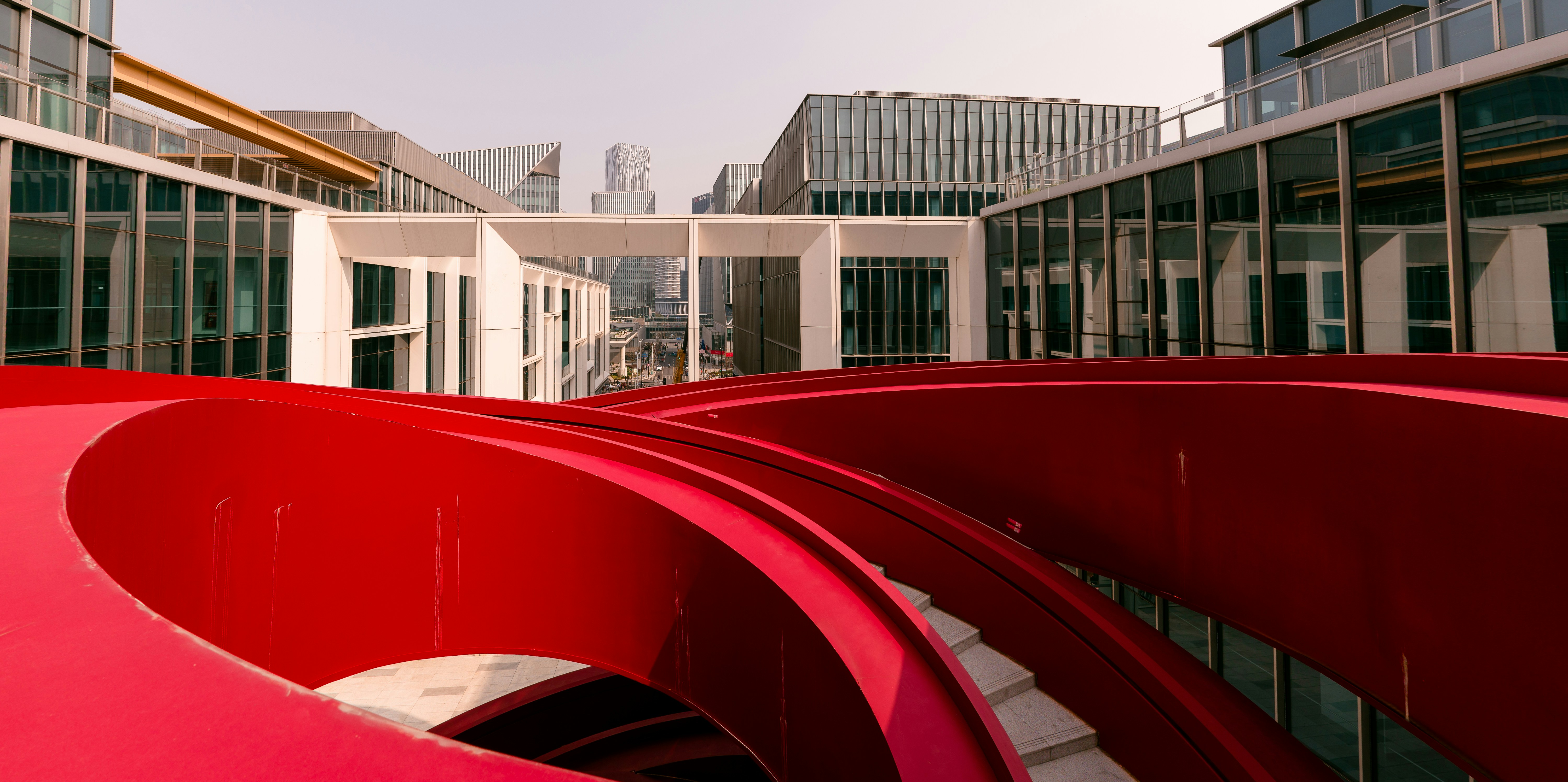 Modern architecture features a red winding structure. photo – Free City ...