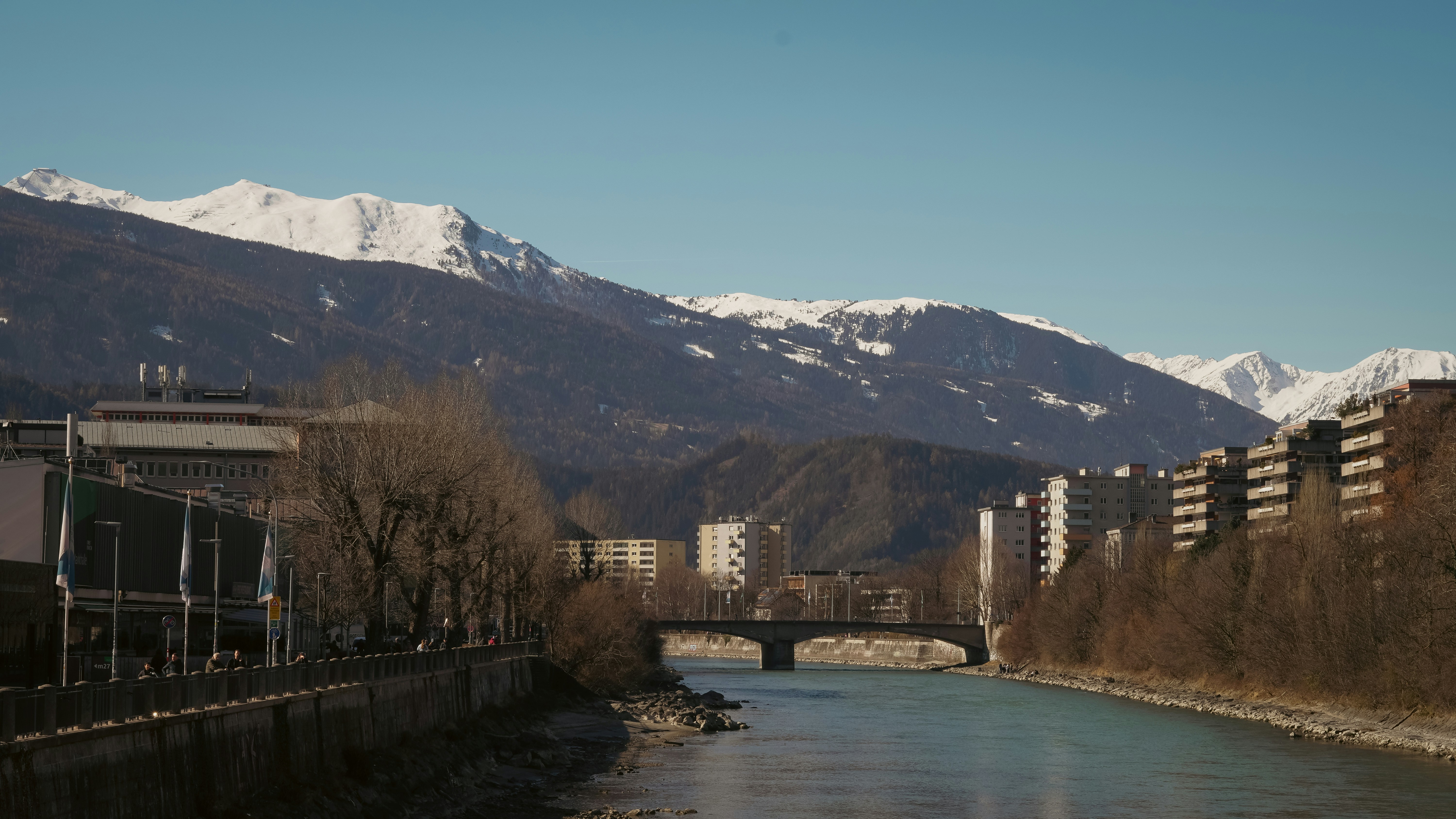 Riverline Under Snowcapped Peaks