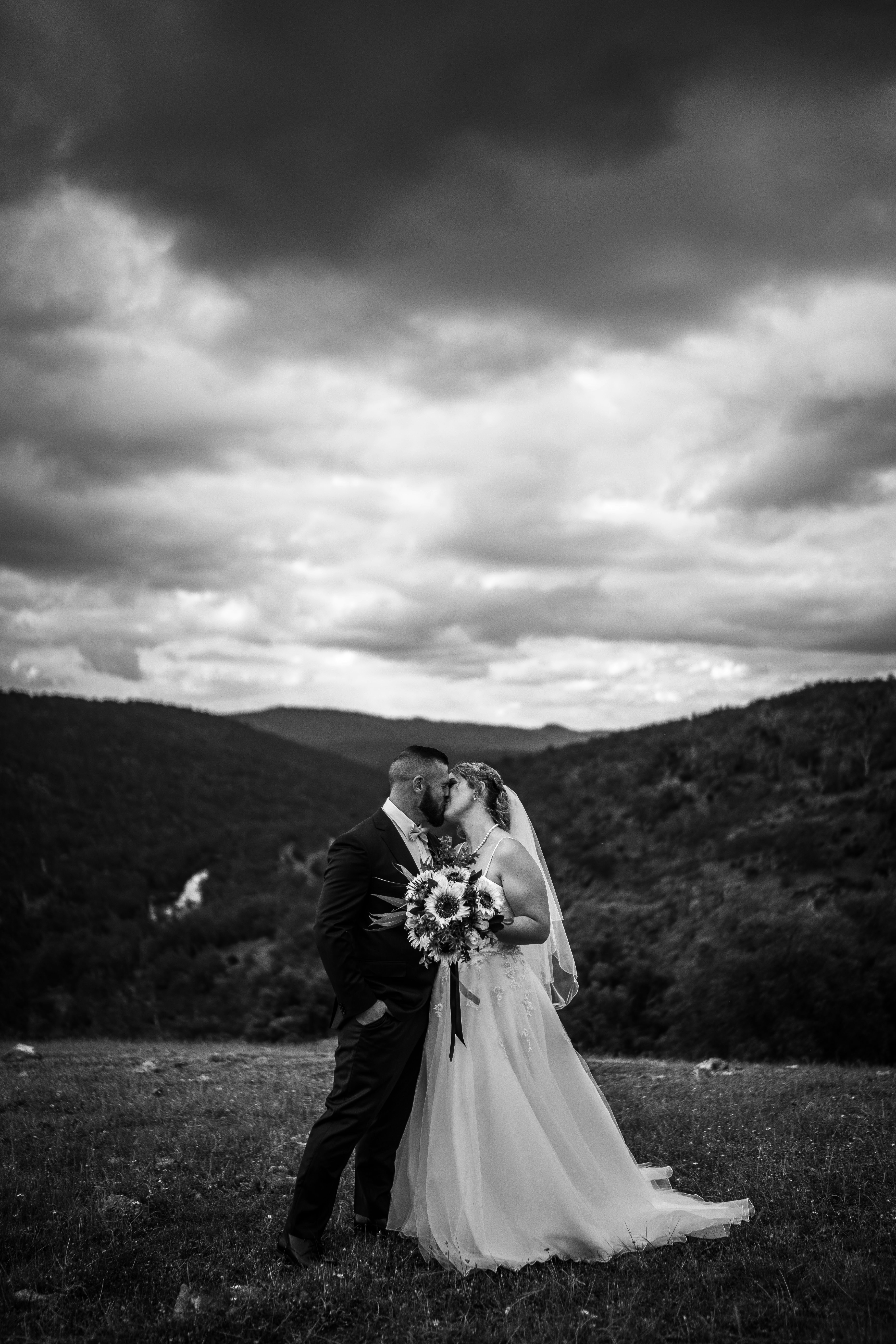 Vows Beneath the Storm: A Bridal Kiss in the Highland Ridge