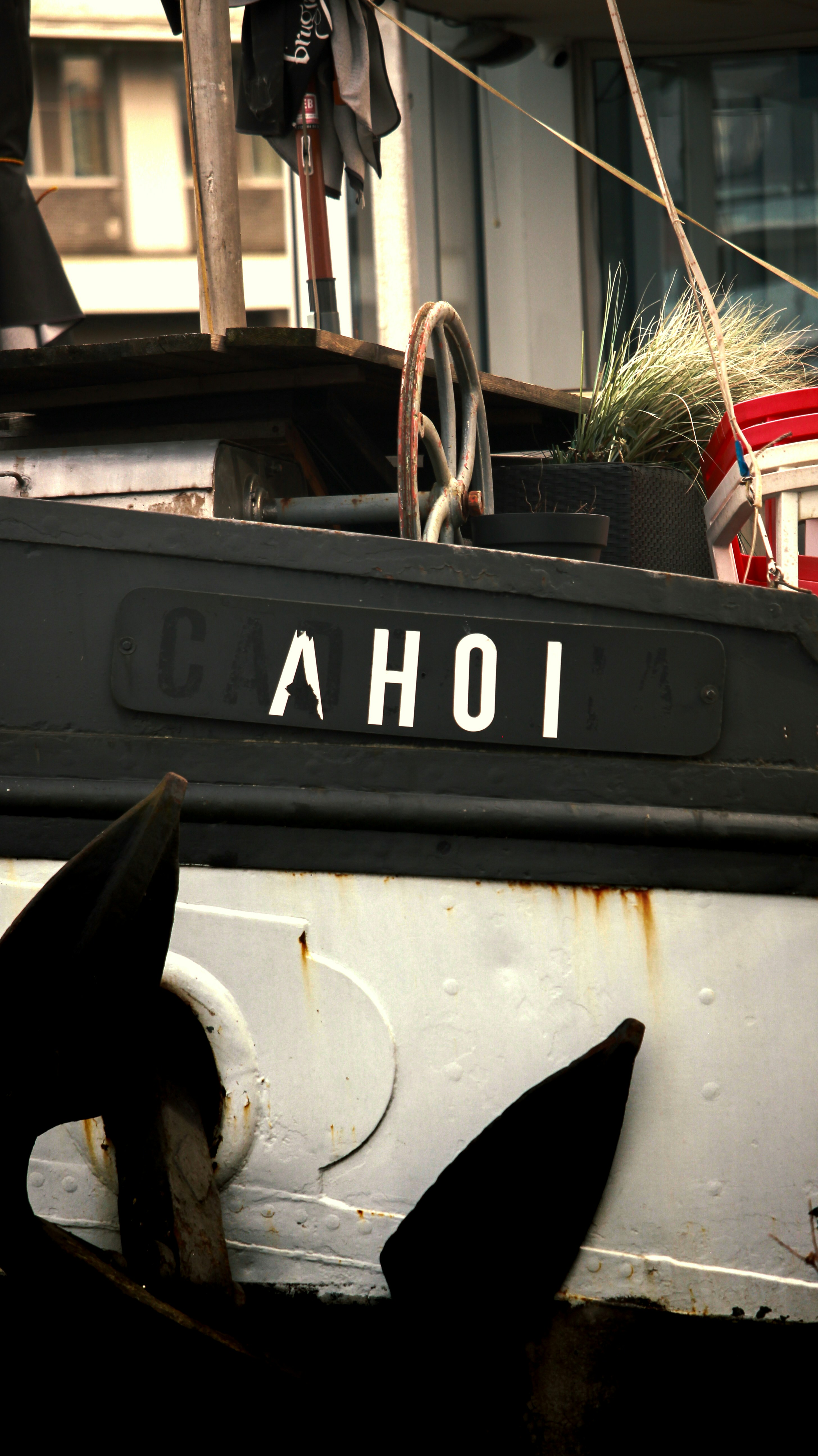 CAHOI's Weathered Nameplate: Rust, Rigging, and Quiet Strength