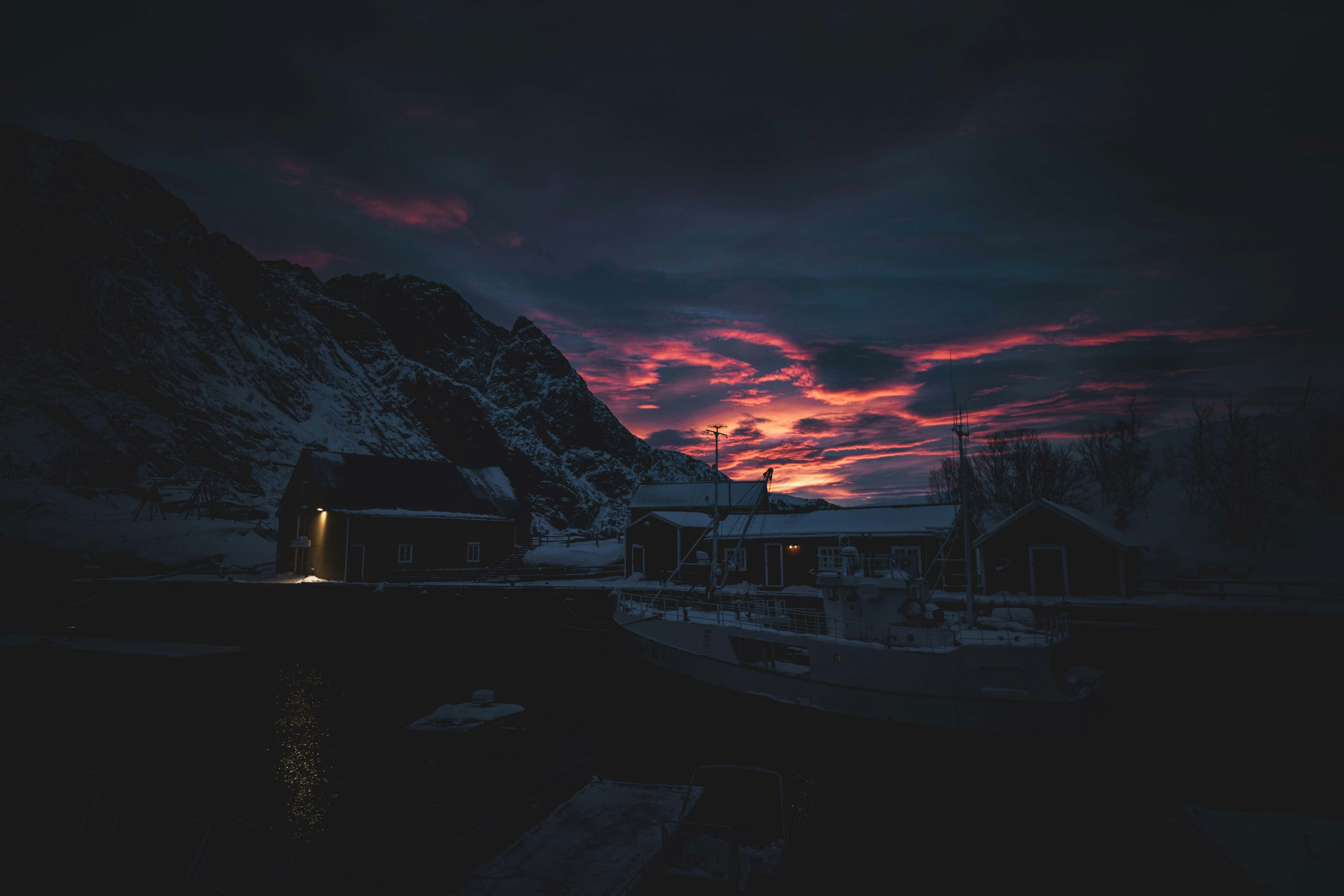 Aurora's Quiet Embrace Over Arctic Village