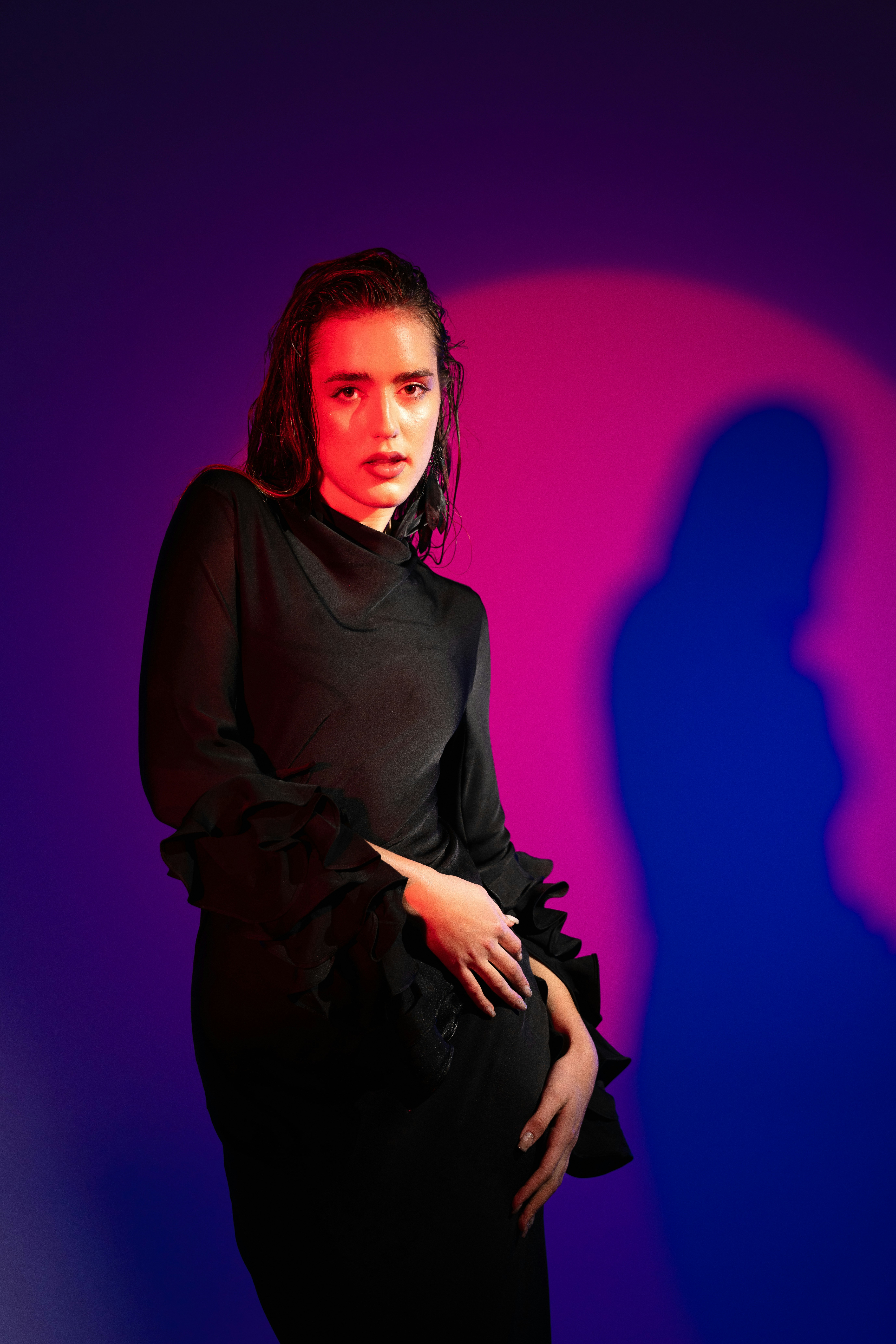 Woman poses dramatically with a striking lighting. photo – Free Fashion ...