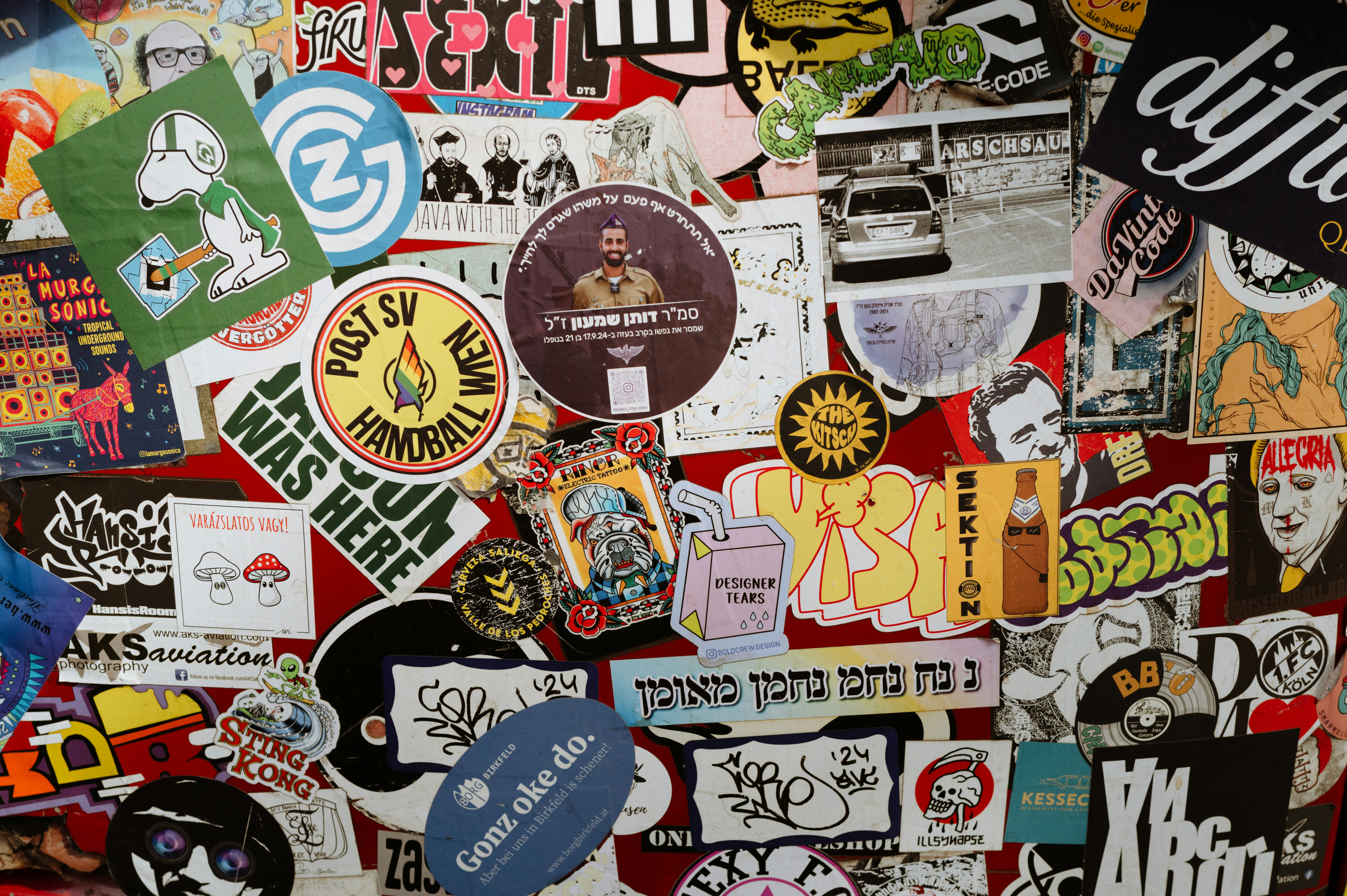 A collection of colorful stickers on red background. photo – Free ...