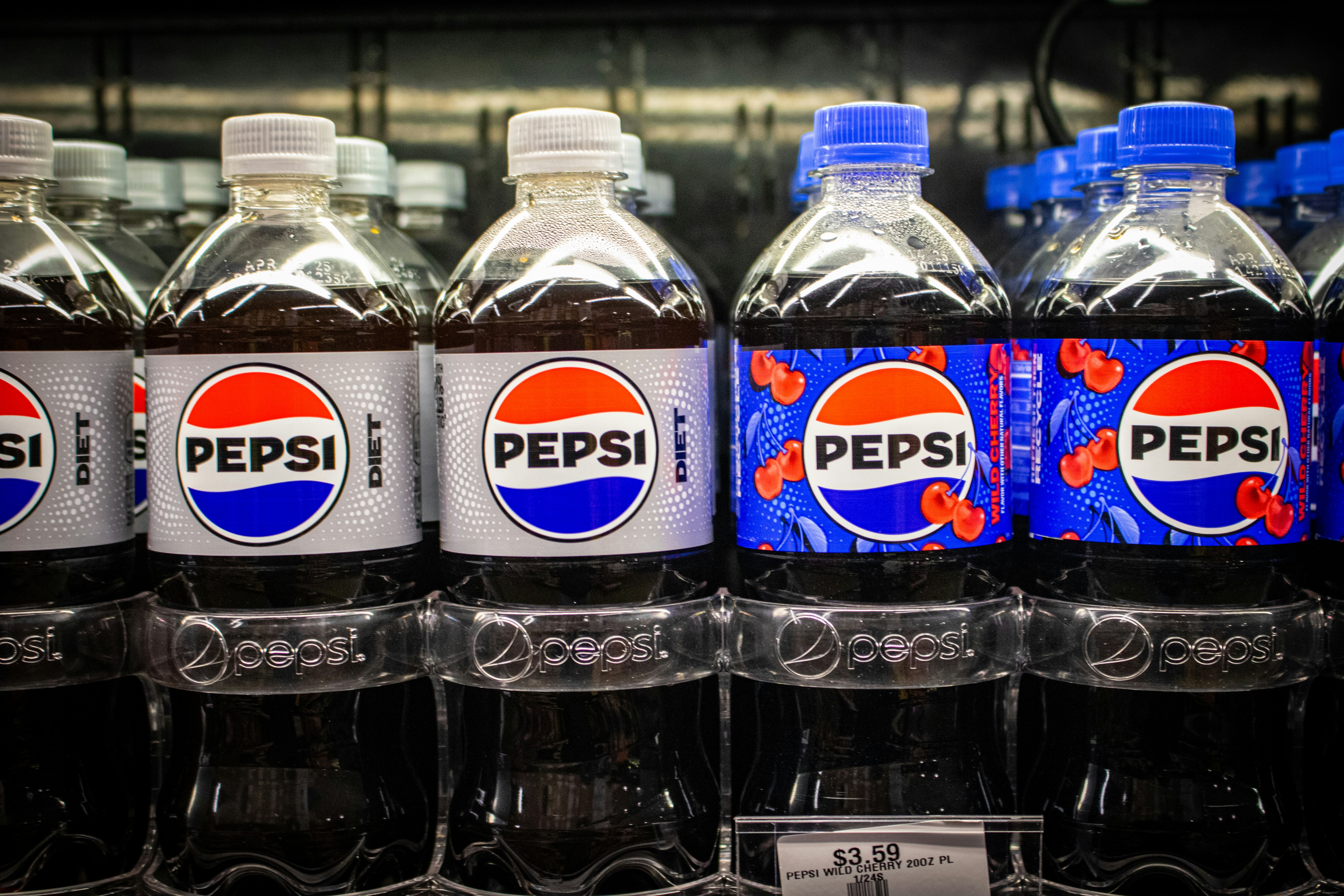 Pepsi products on display in a grocery store. photo – Free Drinks Image ...