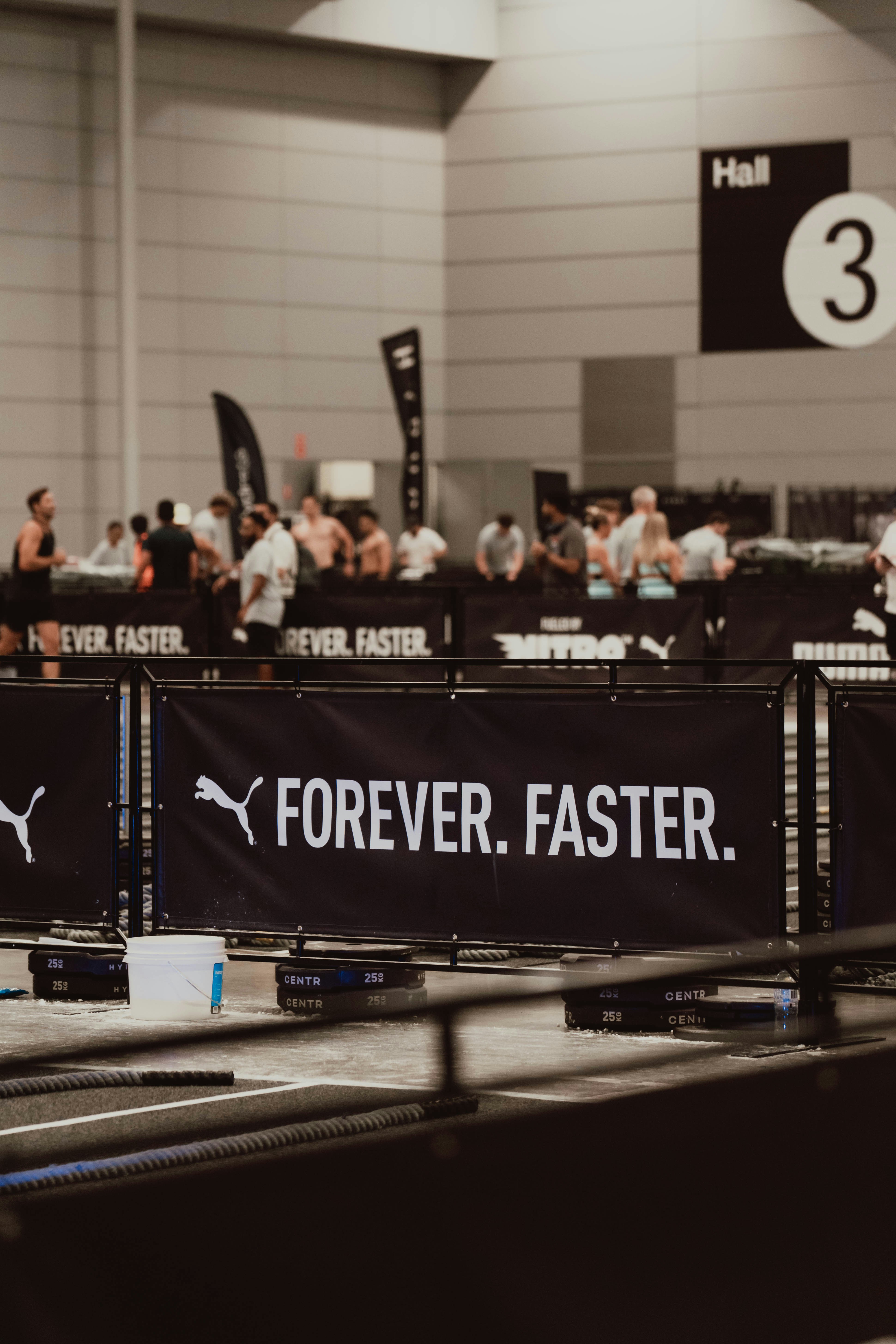Puma's "forever. faster." banner at an event. photo – Free Australia ...