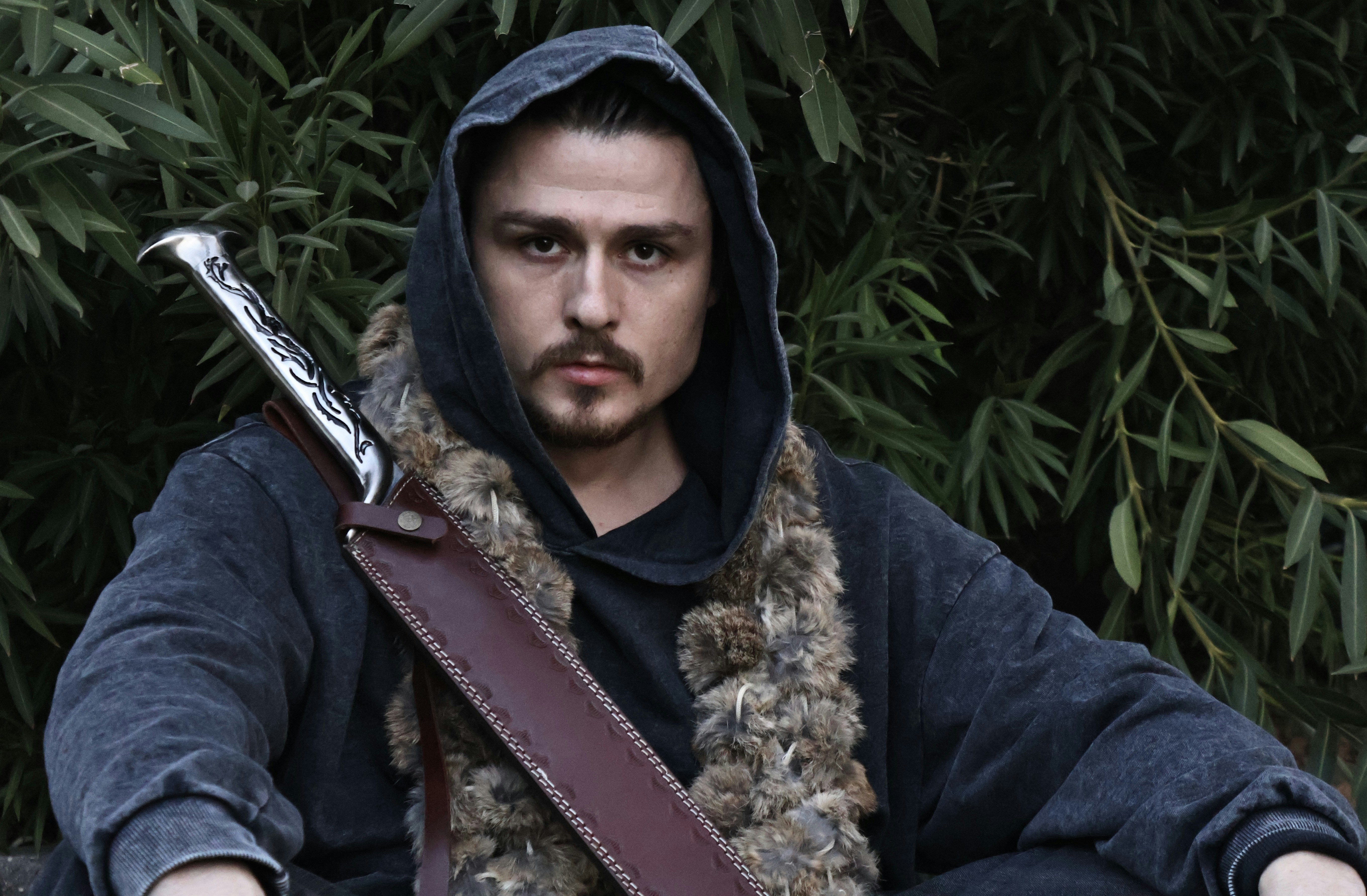Bamboo Shadows: The Fur-Wrapped Warrior and His Ornate Sword