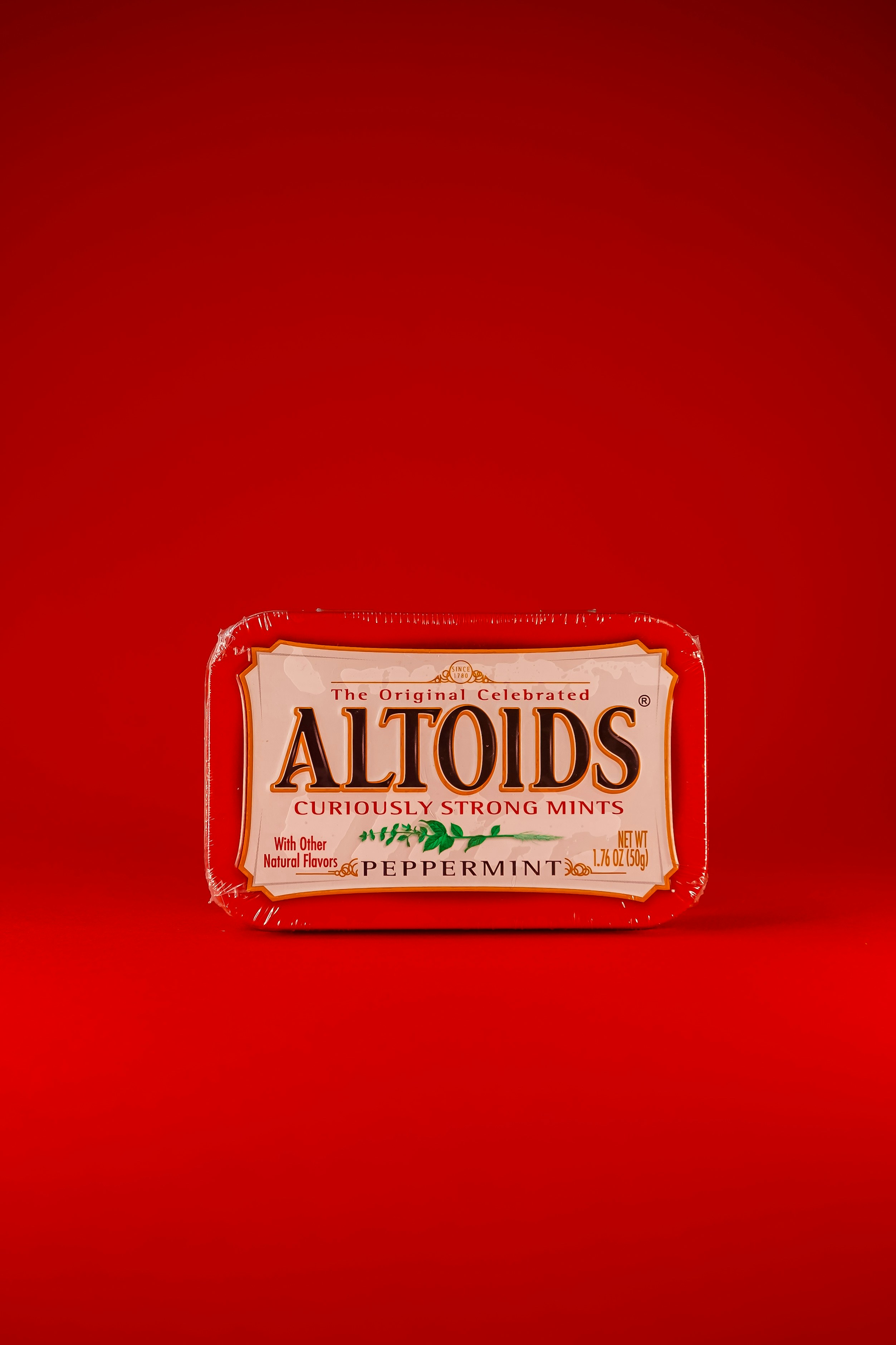 Altoids peppermint mints in a red background. photo – Free Red Image on ...