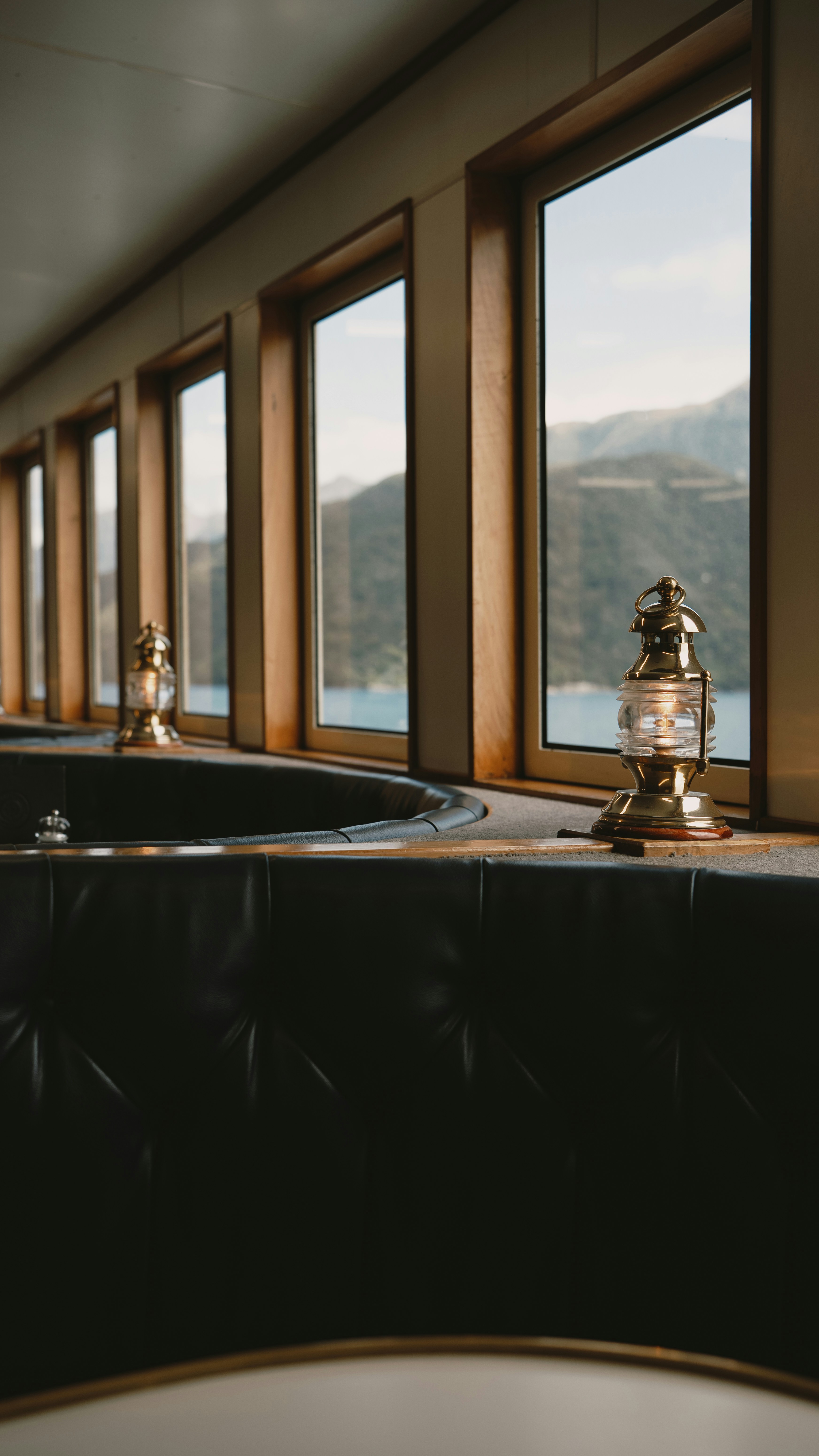 Lanterns by the Window: Quiet Corner in a Lakefront Lounge