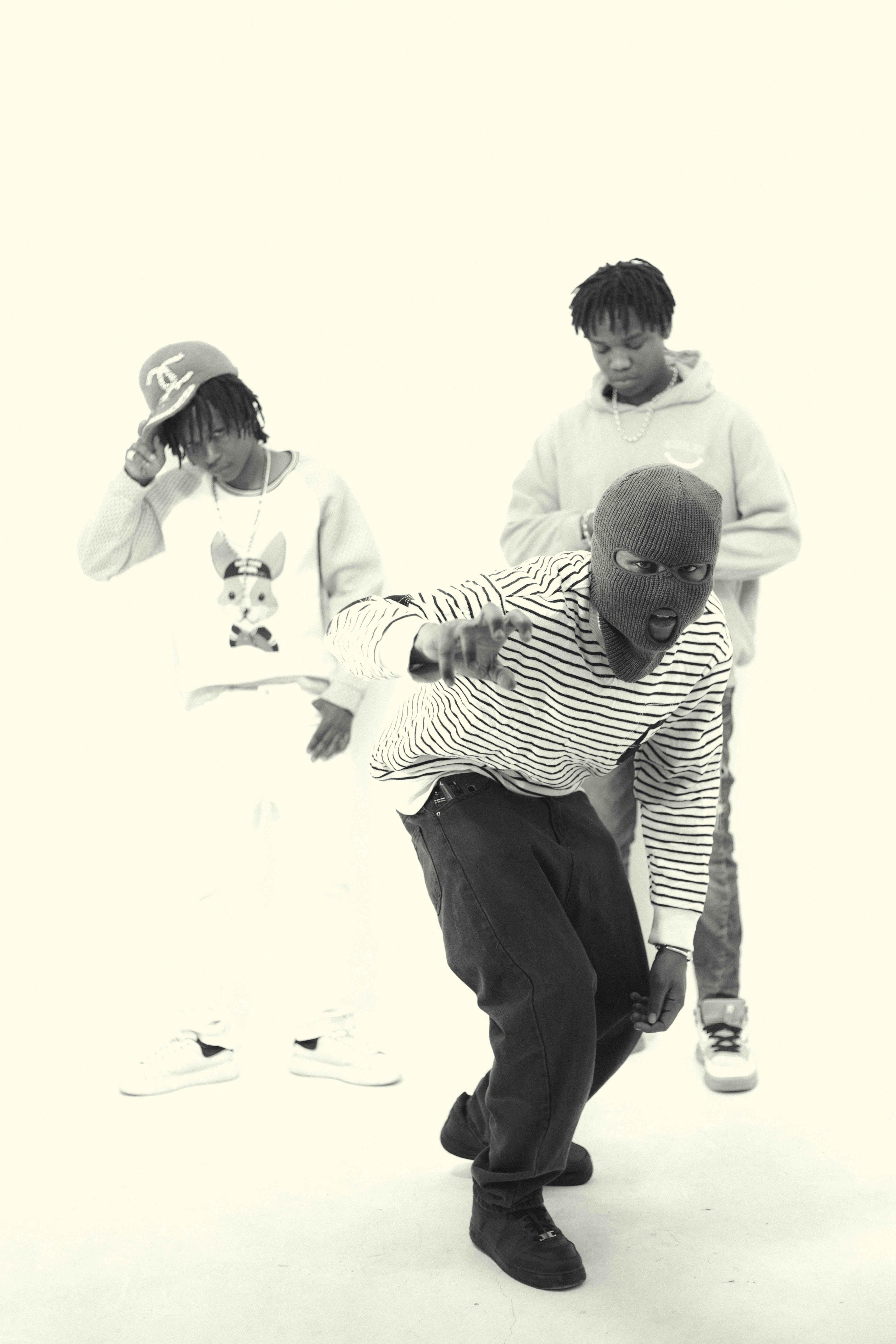 Three young men pose for a picture. photo – Free Portrait Image on Unsplash