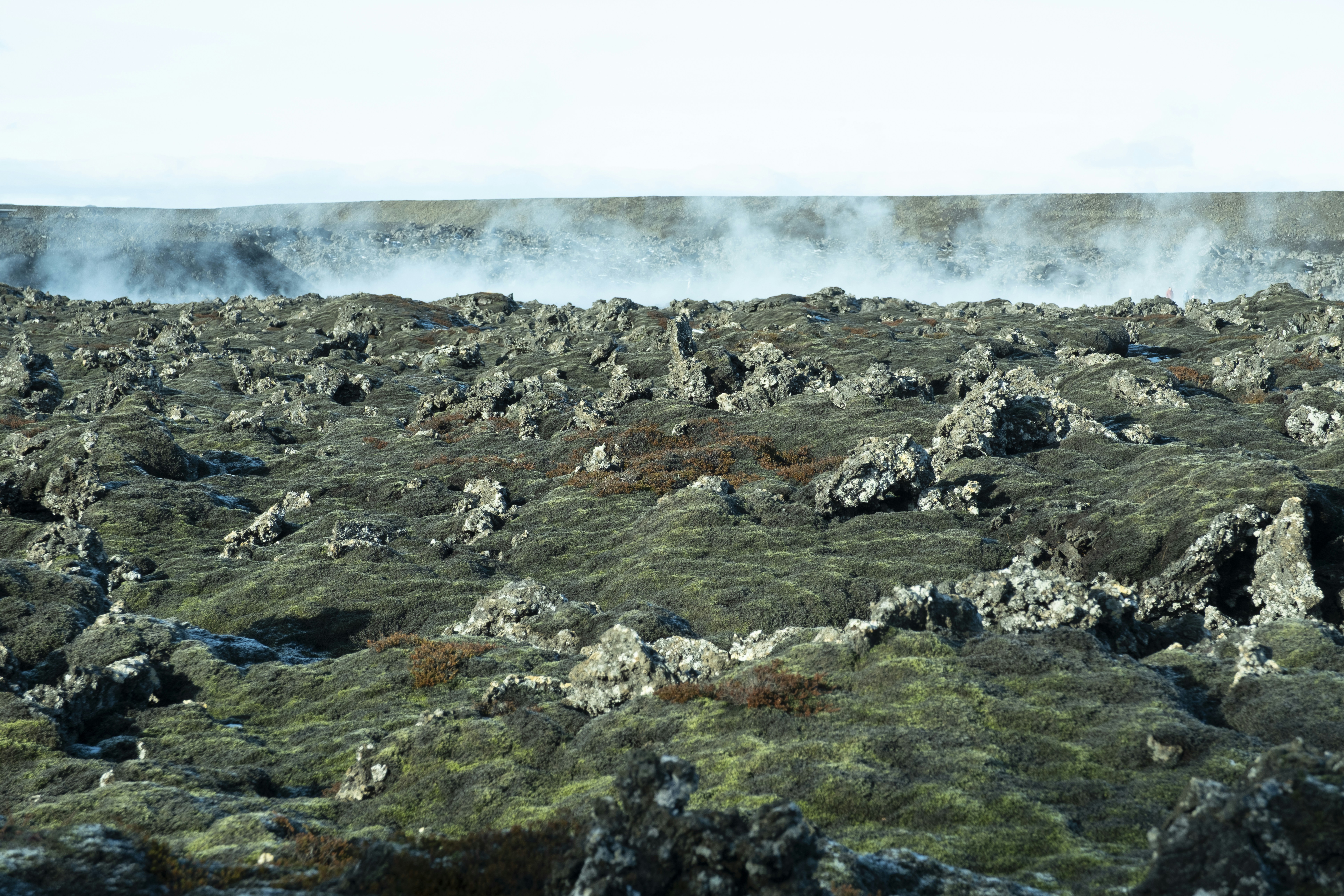 Steaming rocks with misty horizon. photo – Free Volcano Image on Unsplash