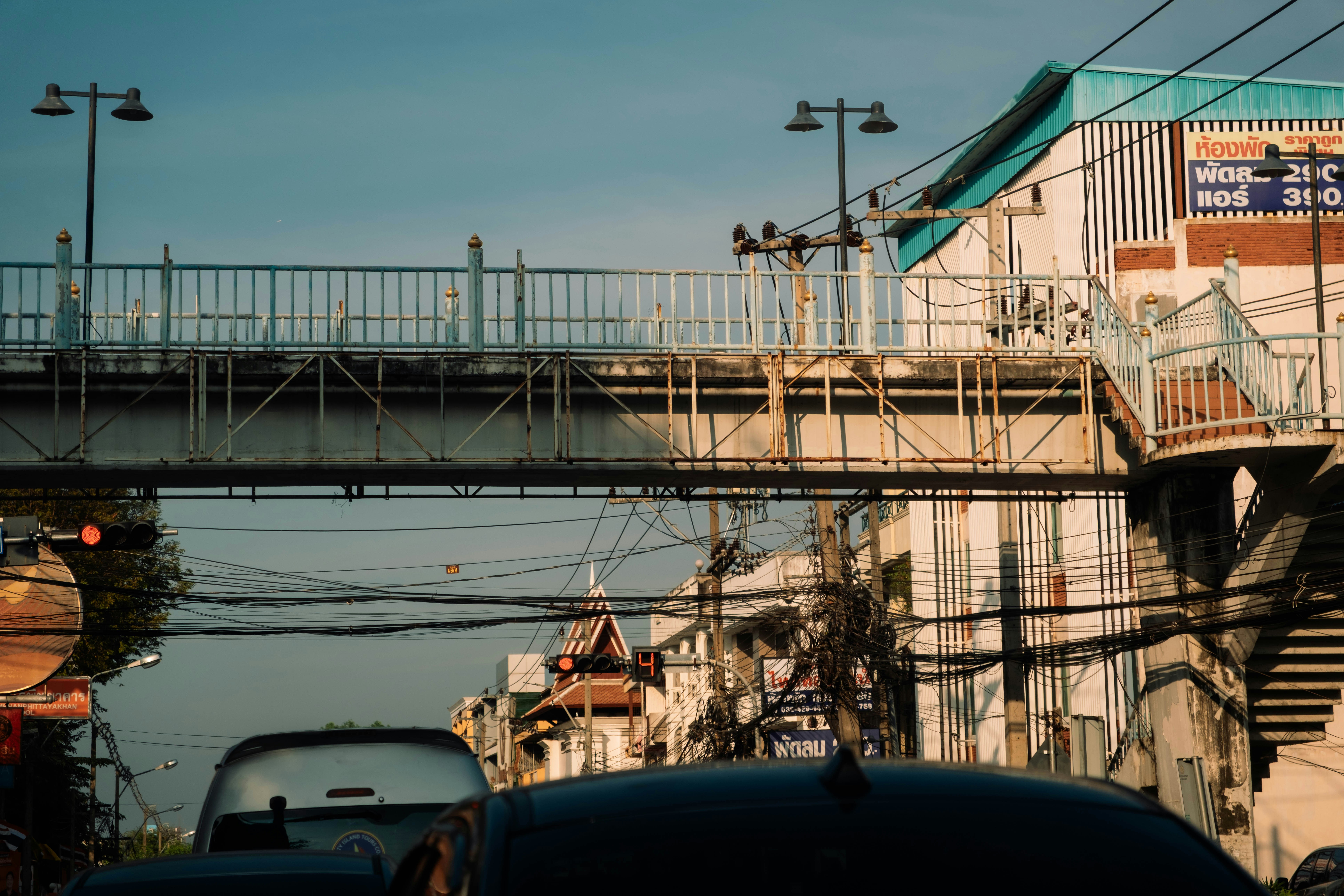 Overpass in the Morning Light: Wires, Rails, and a City Crossing
