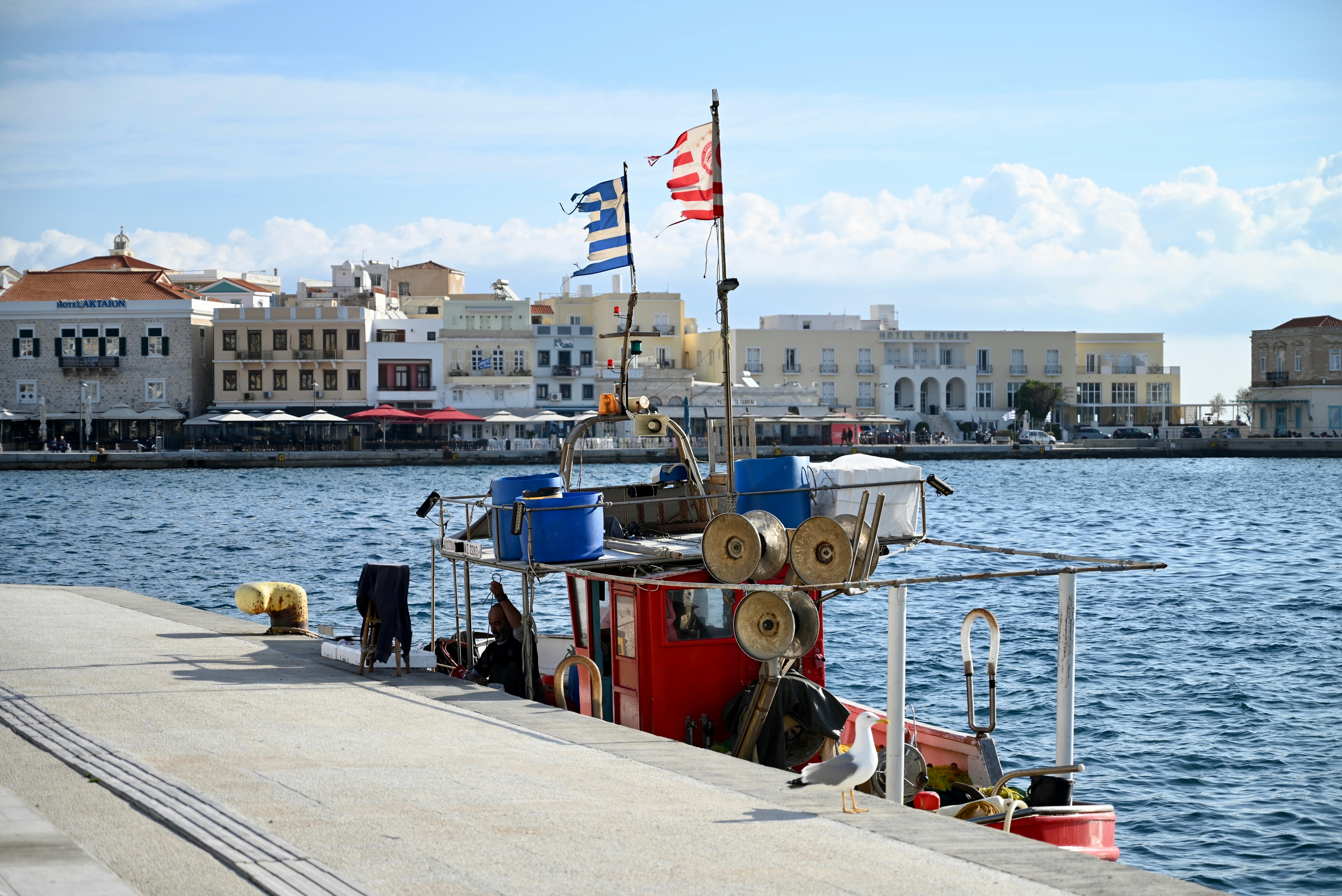 Seaside Harmony: Flags and Fishing Vessels