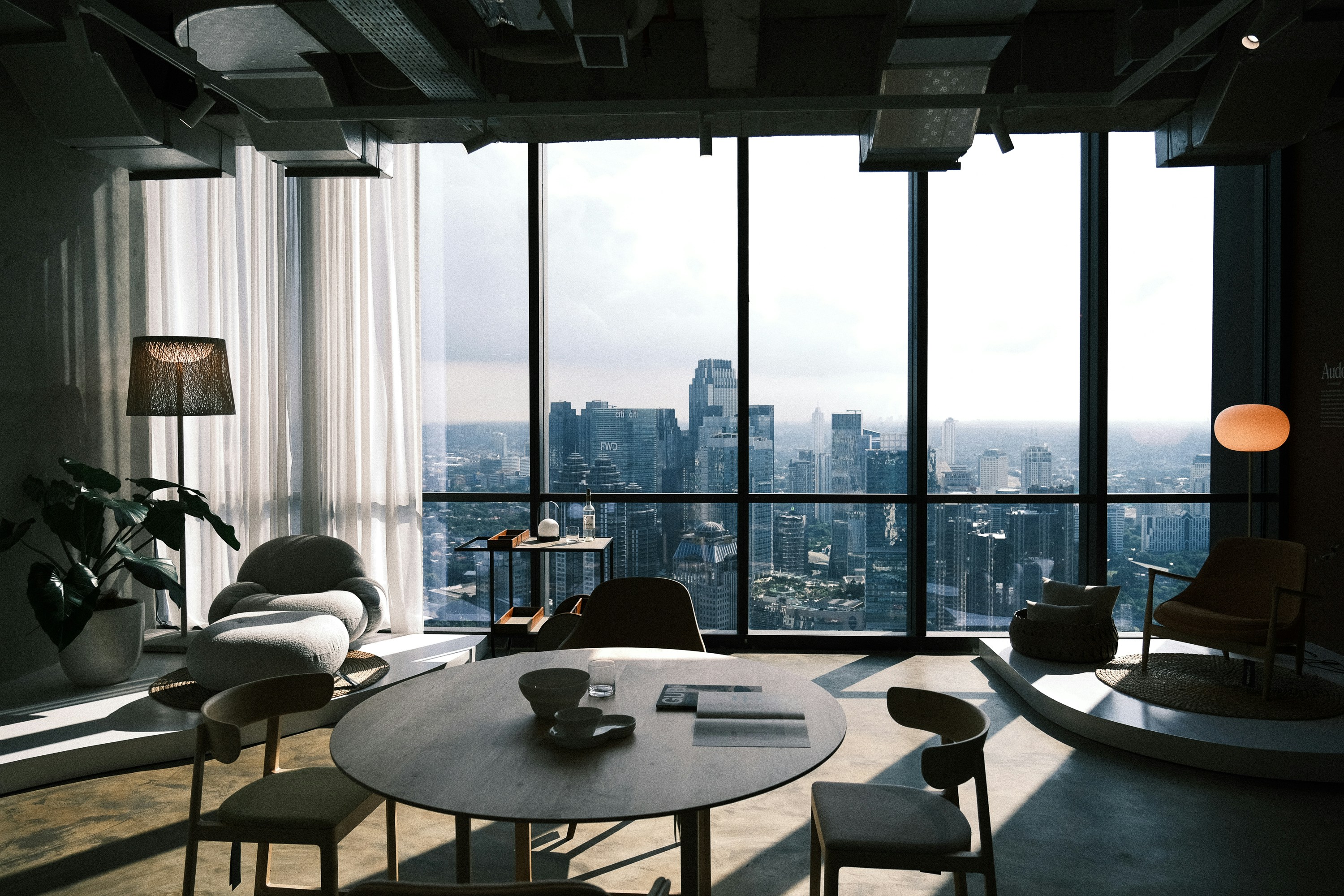 Modern office space overlooks a scenic city skyline. photo – Free ...