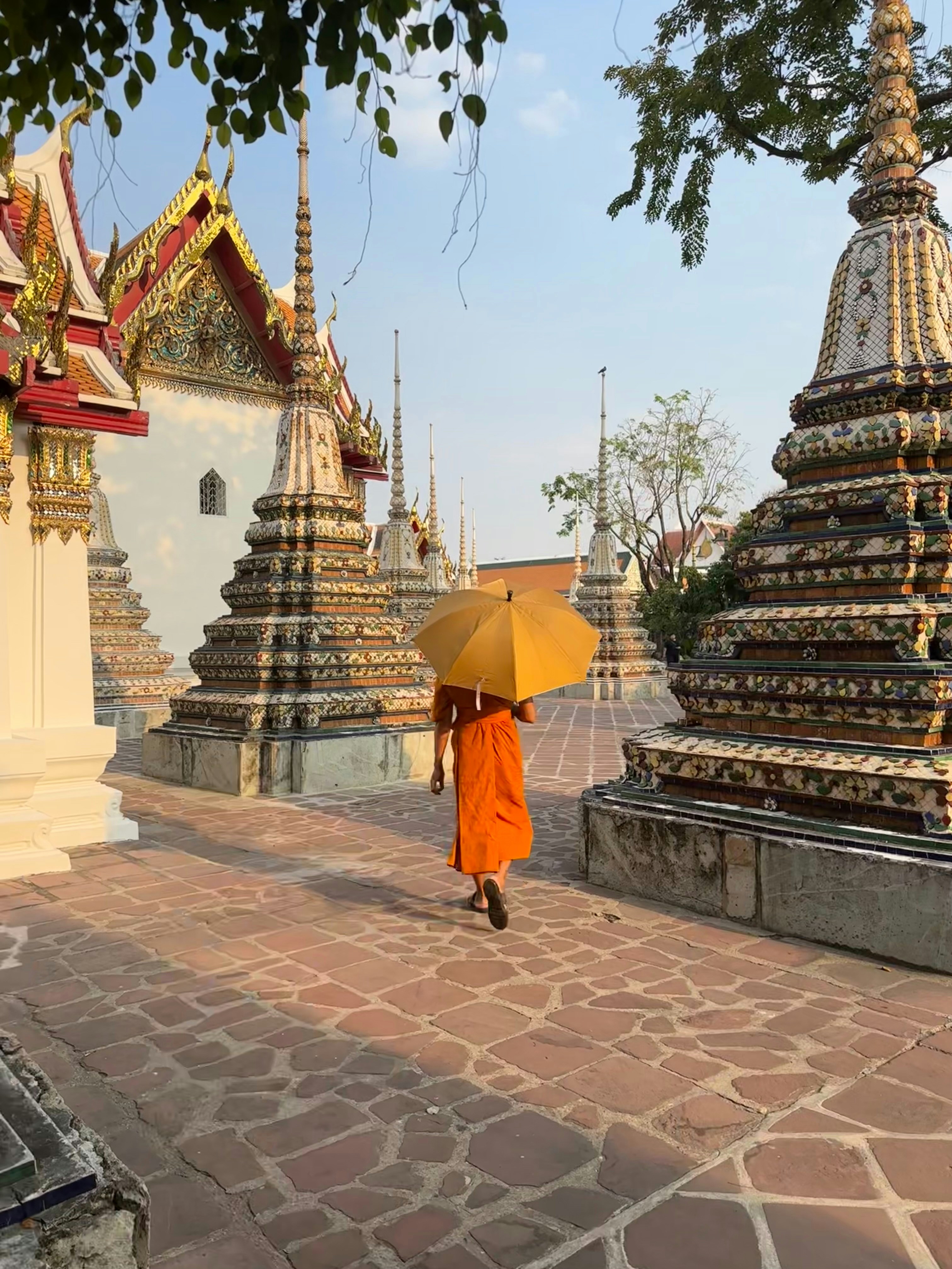 Golden Stroll Amidst Thai Temples