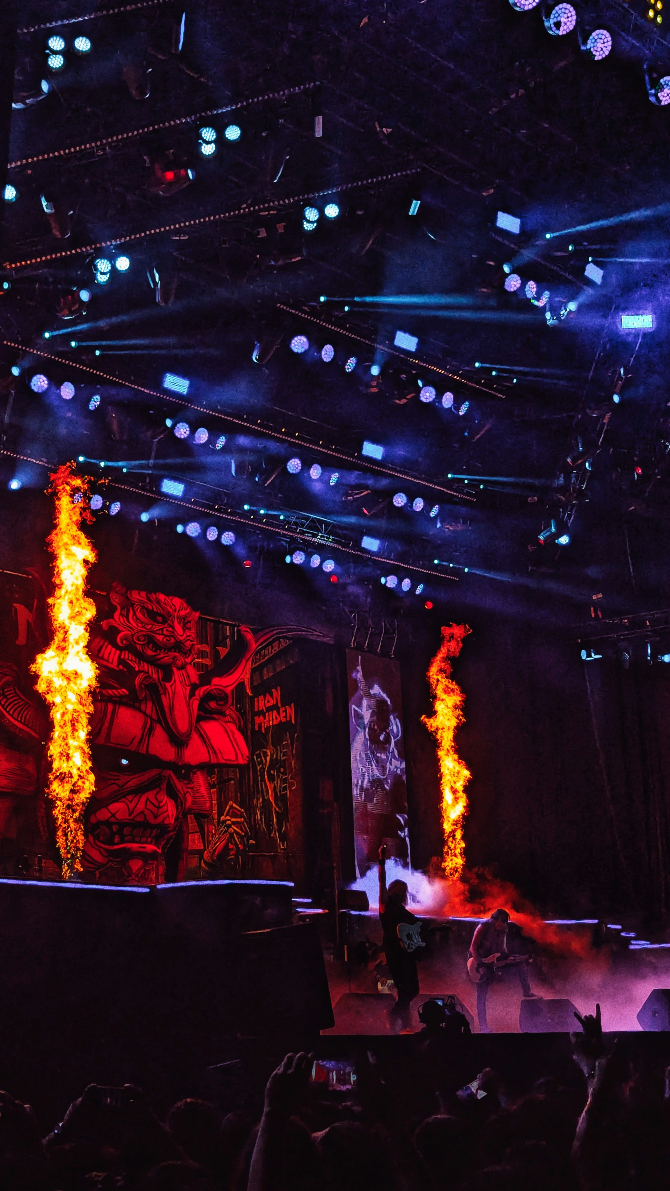 A heavy metal concert stage with flame effects. photo – Free Woman ...