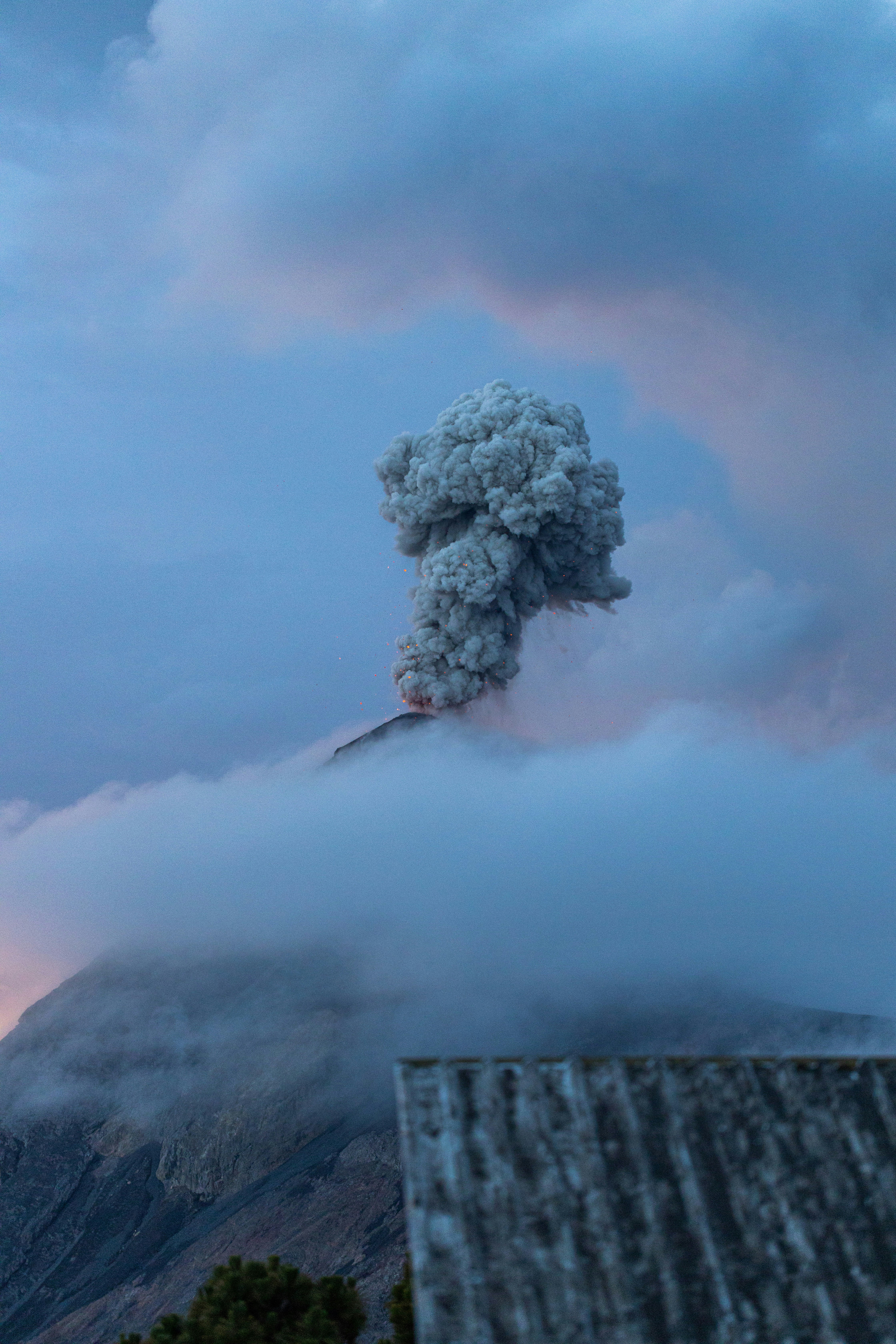 A volcanic eruption spews smoke into the sky. photo – Free Volcano ...