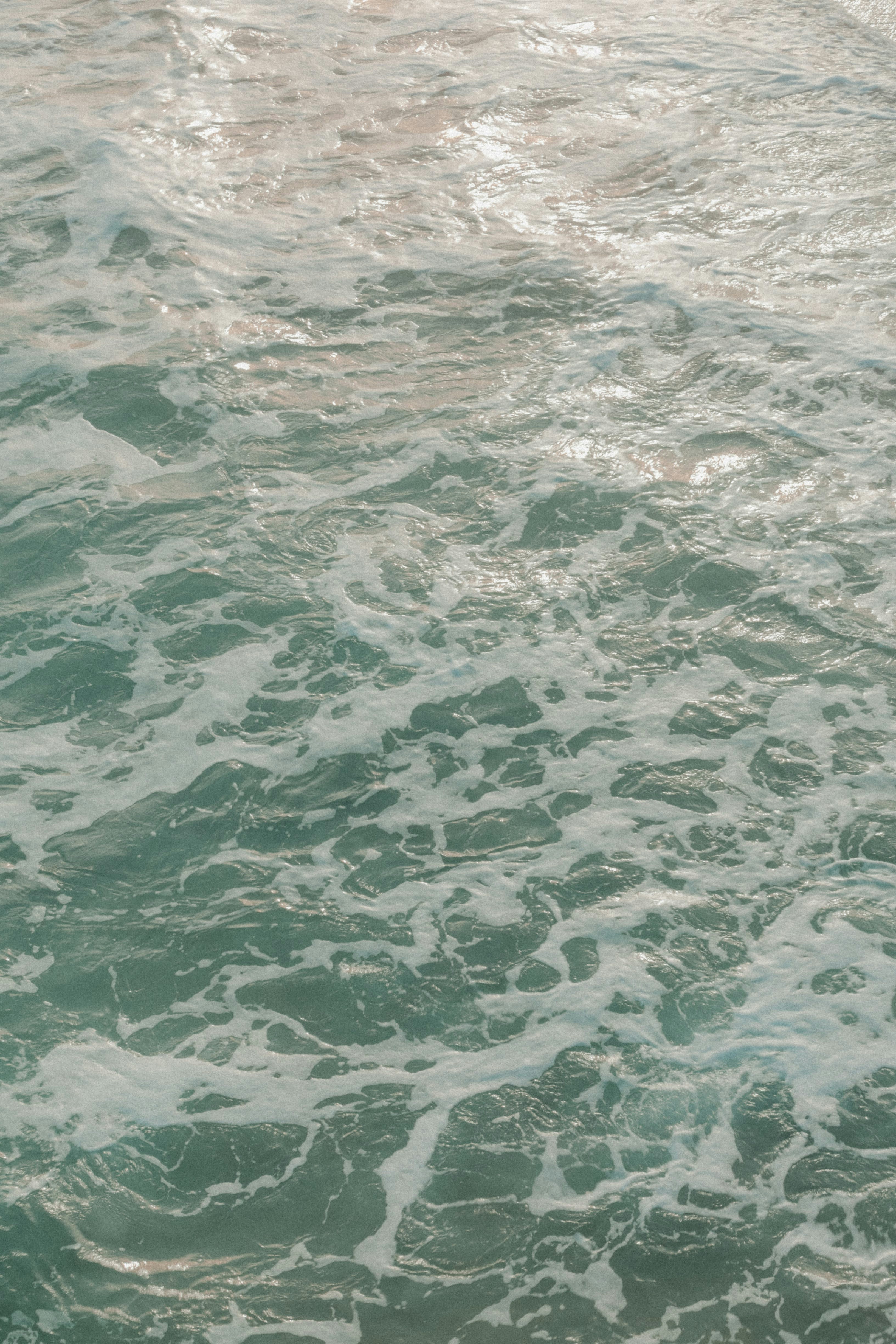 Water surface with white foam and ripples. photo – Free Texture Image ...