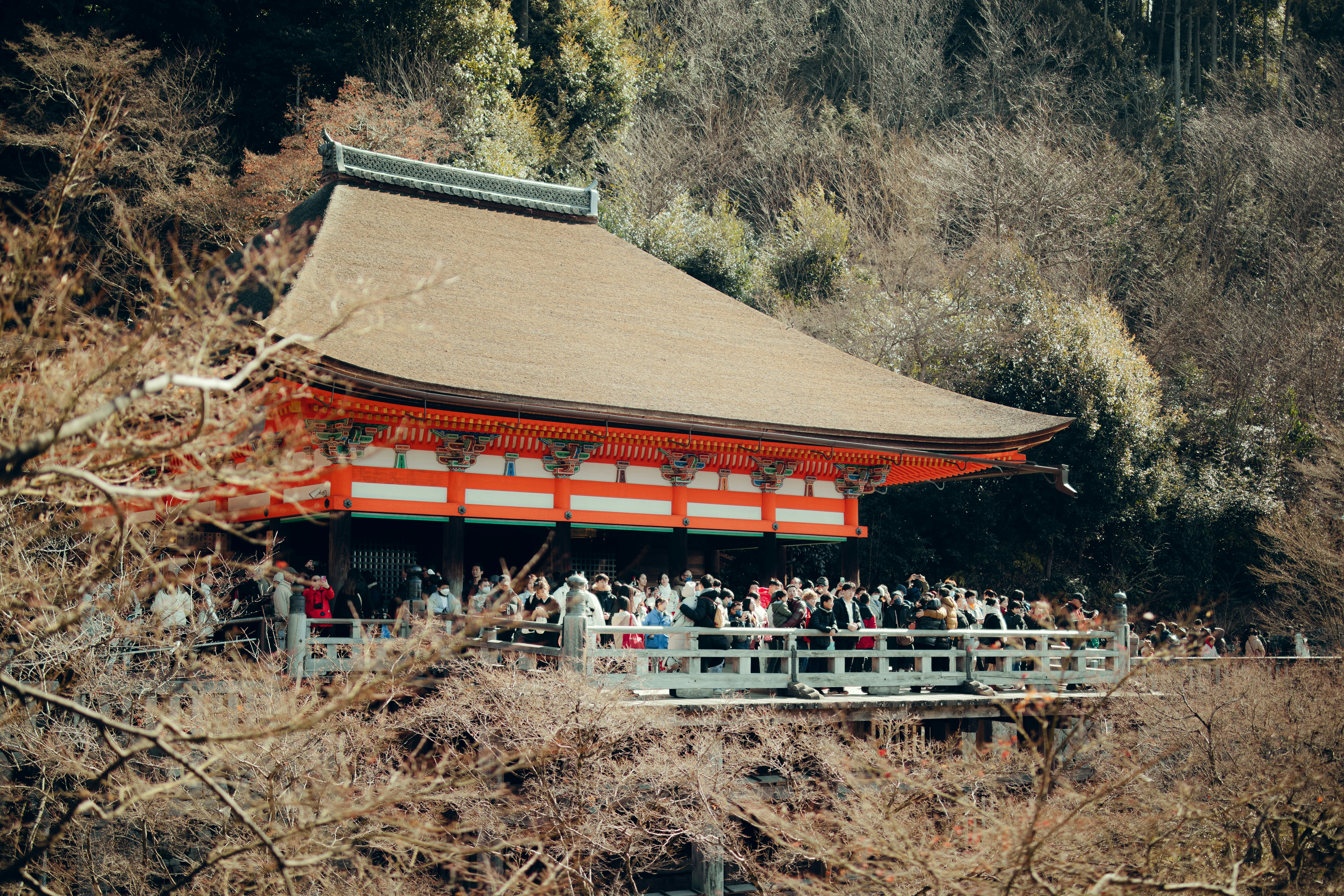 Japanese temple overlooks a crowd of people. photo – Free Building ...