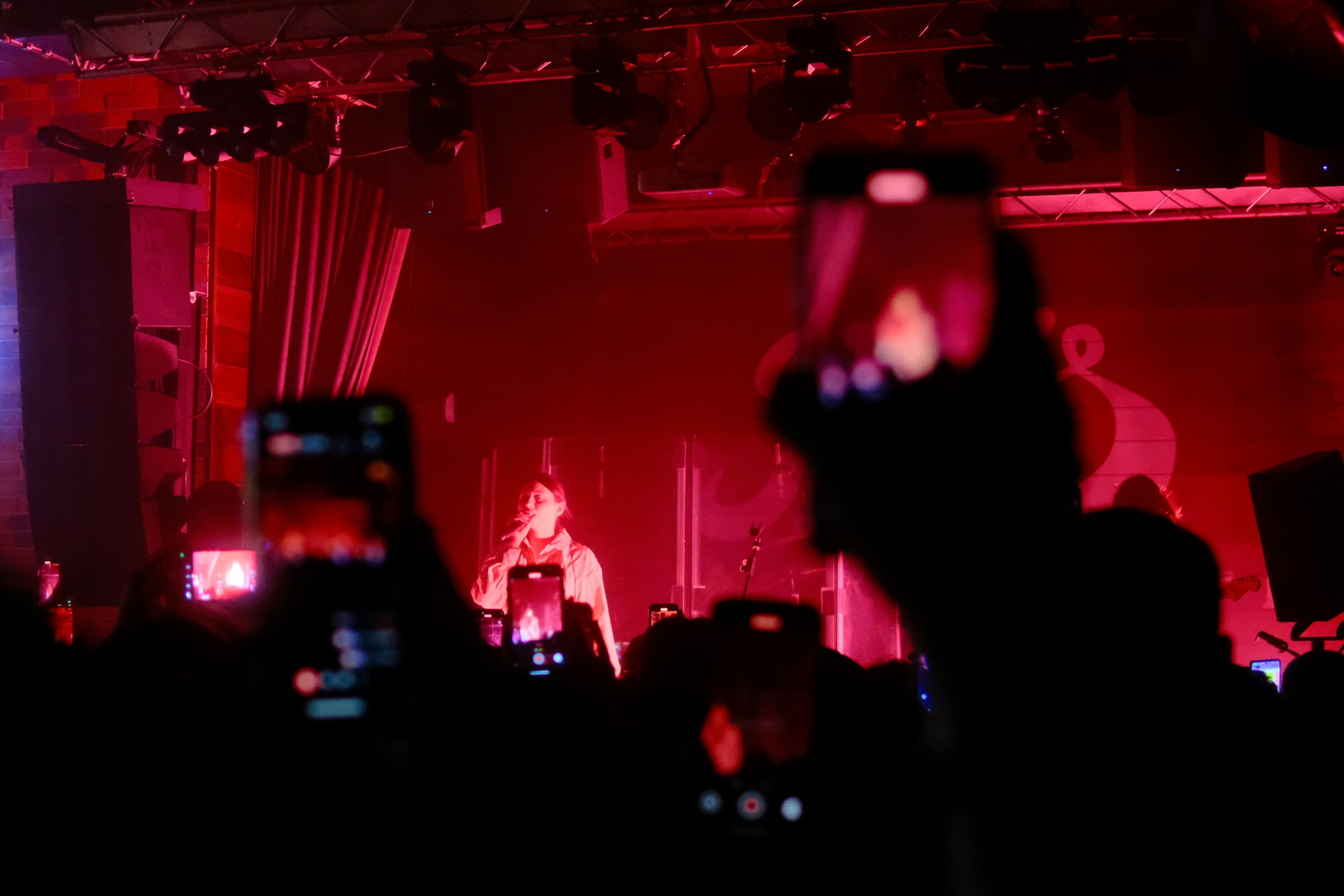 Concert Vibes Through a Sea of Screens