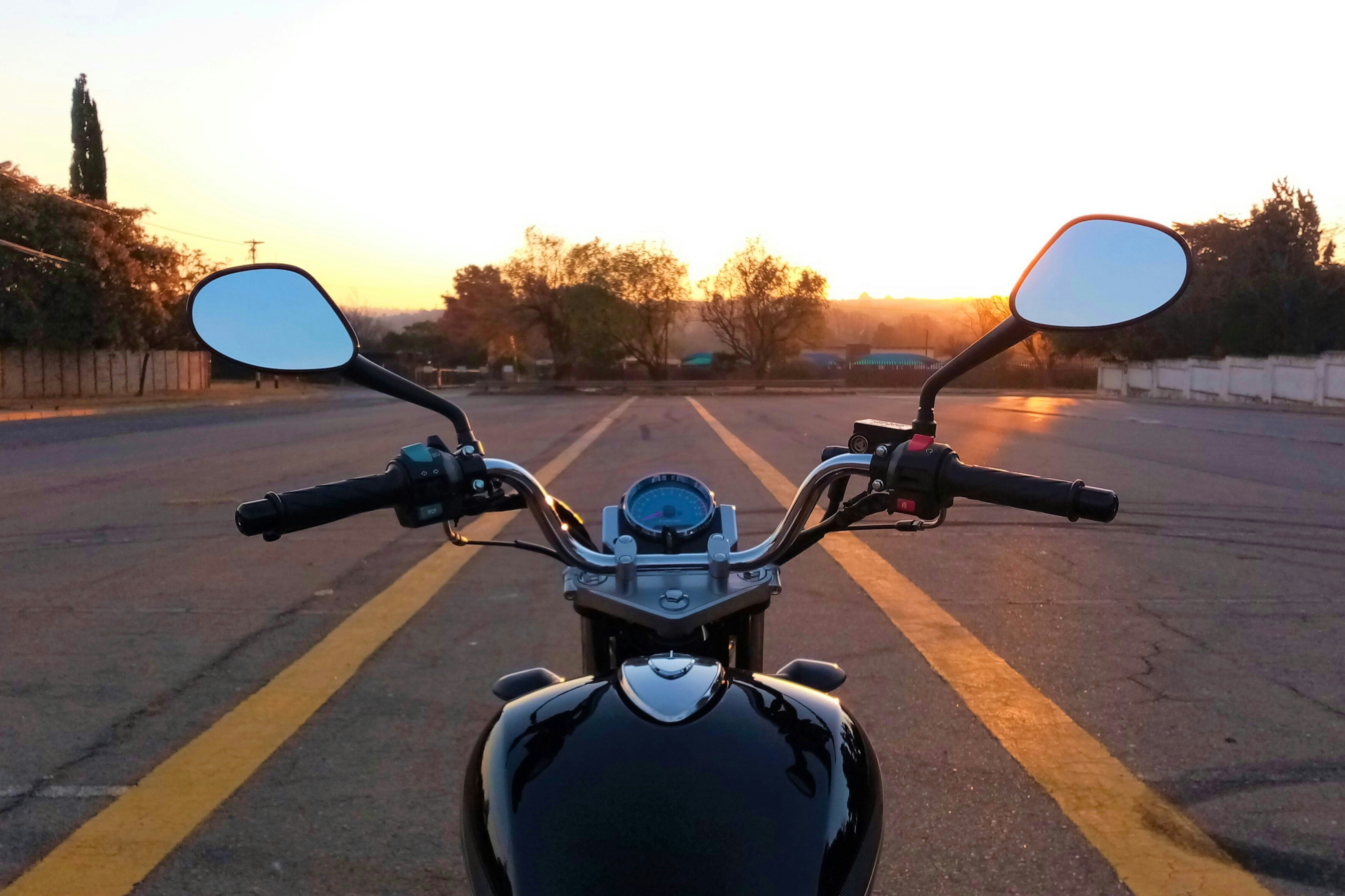 Motorcycle's perspective on the open road at sunset. photo – Free ...