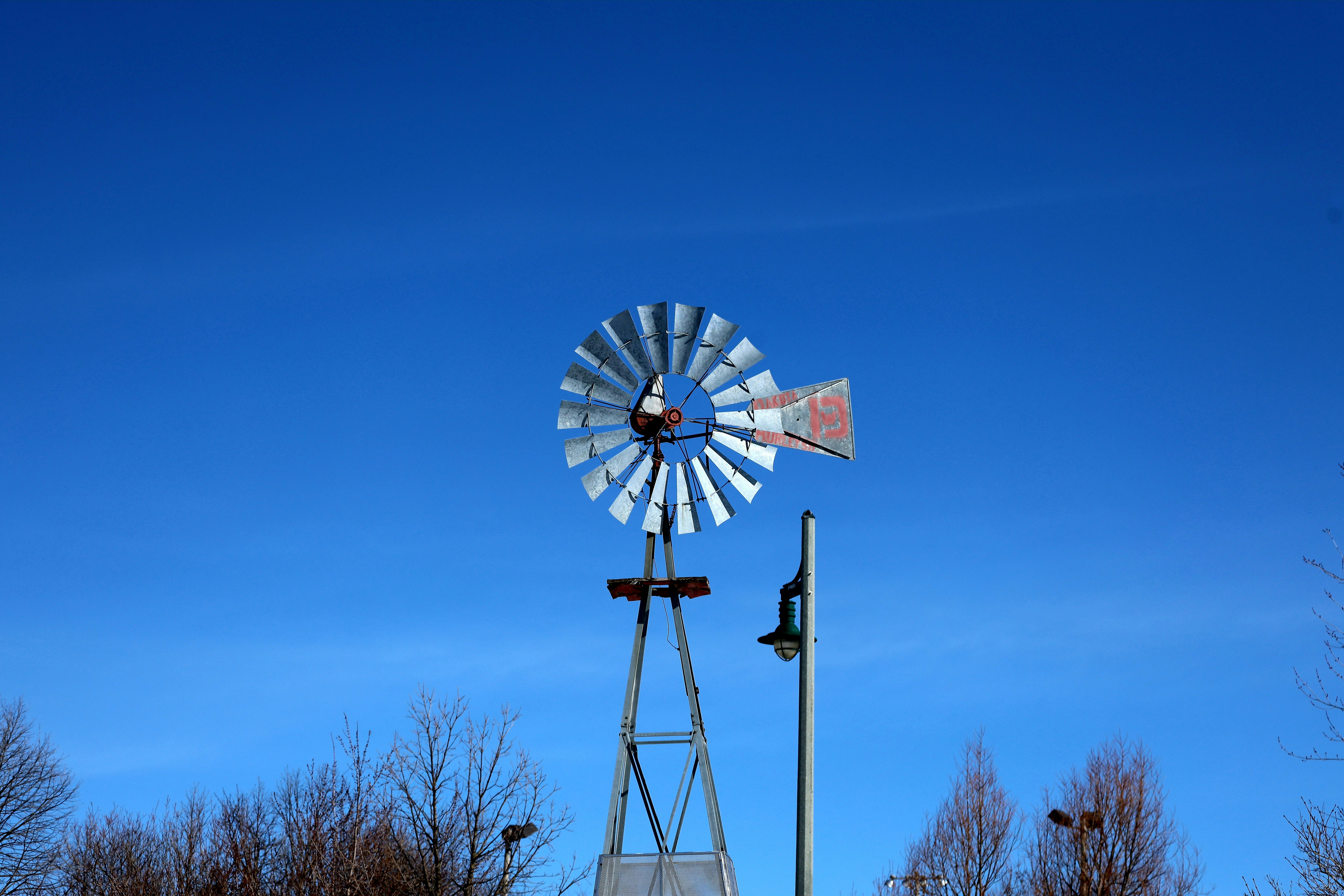 Windmill Sentinel Under a Firm Blue Sky