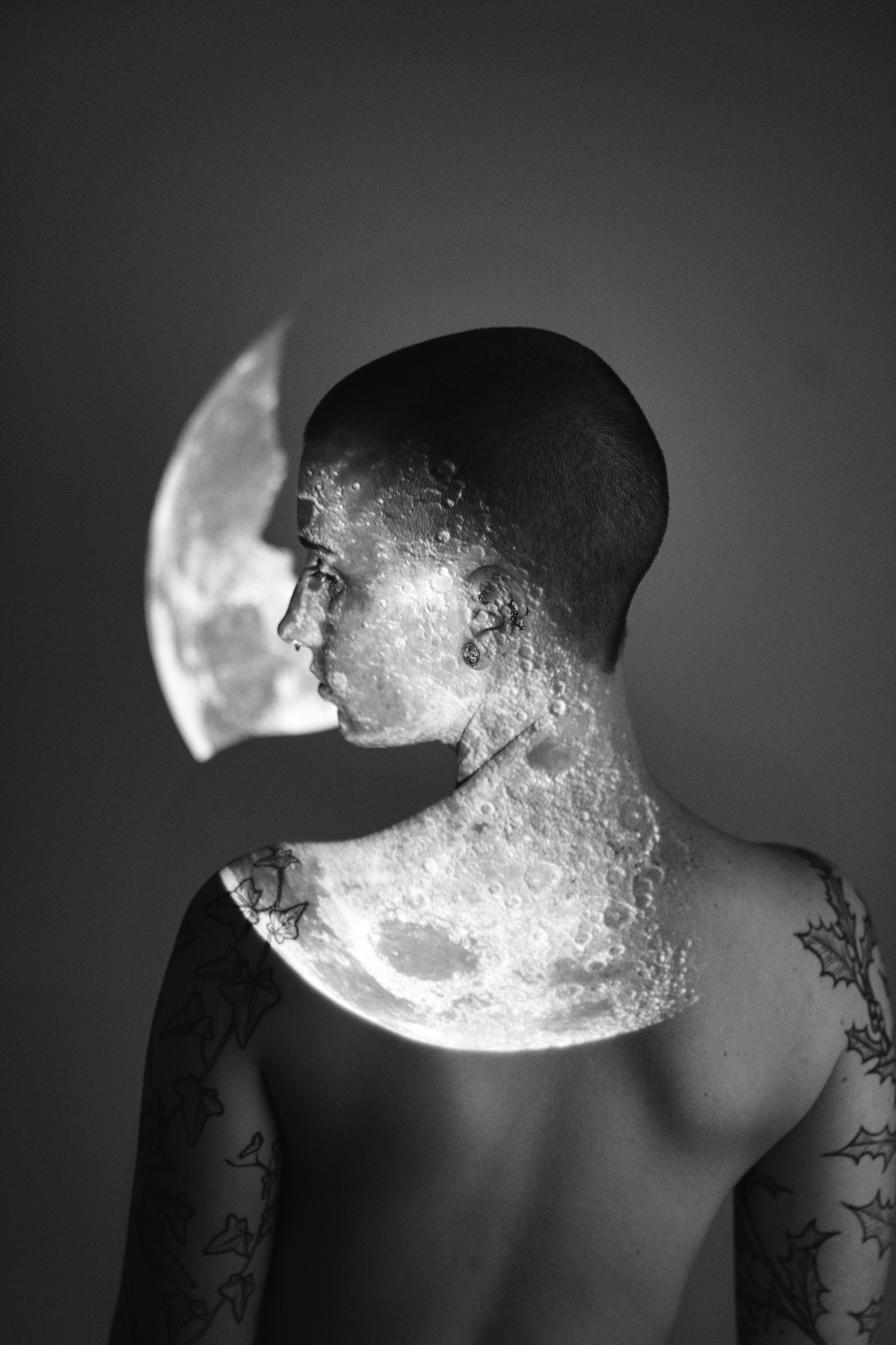 Lunar Profile: Moonlit Ink on a Silent Shoulder