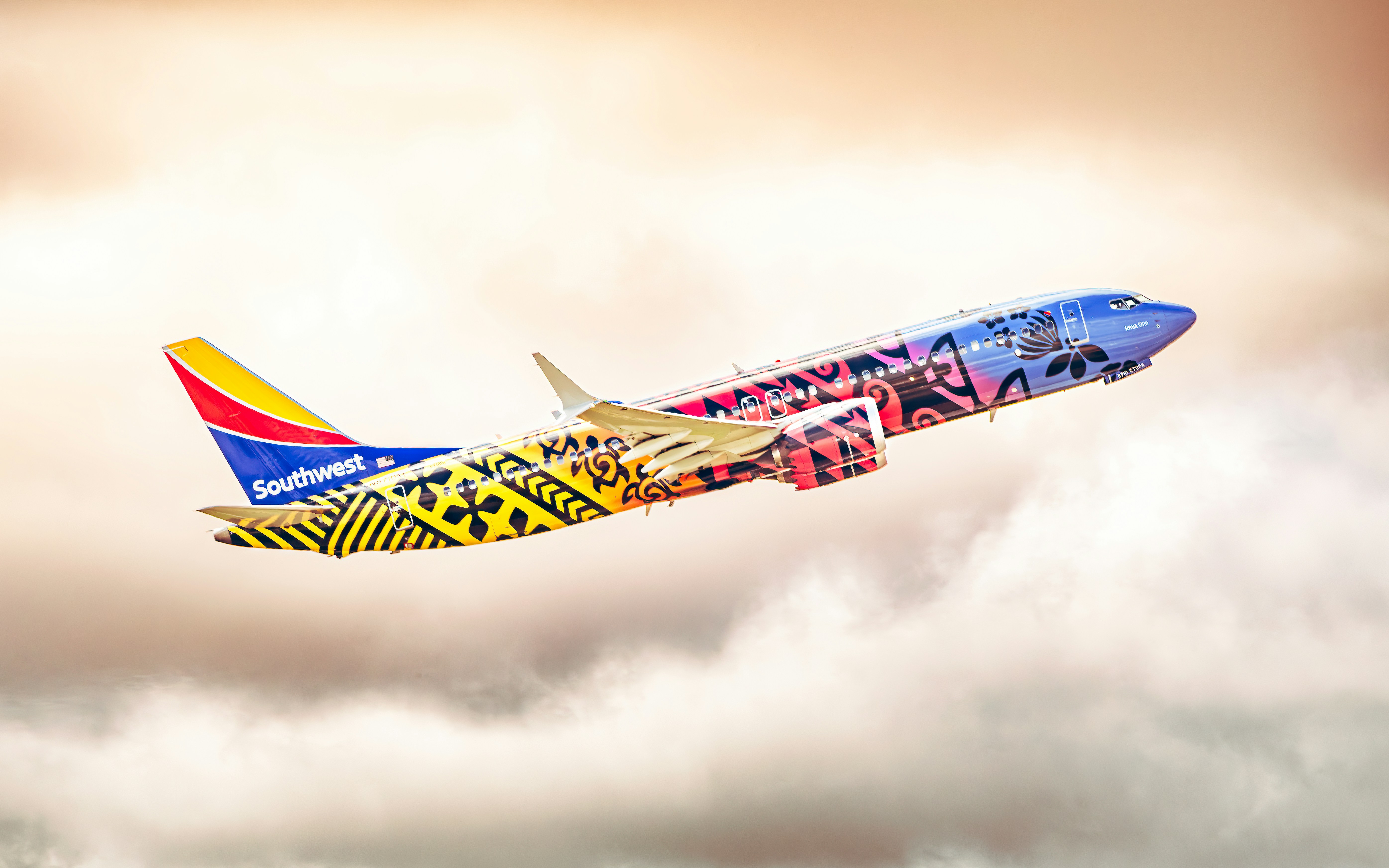 Kaleidoscopic Southwest Jet Slicing Through the Cloudscape