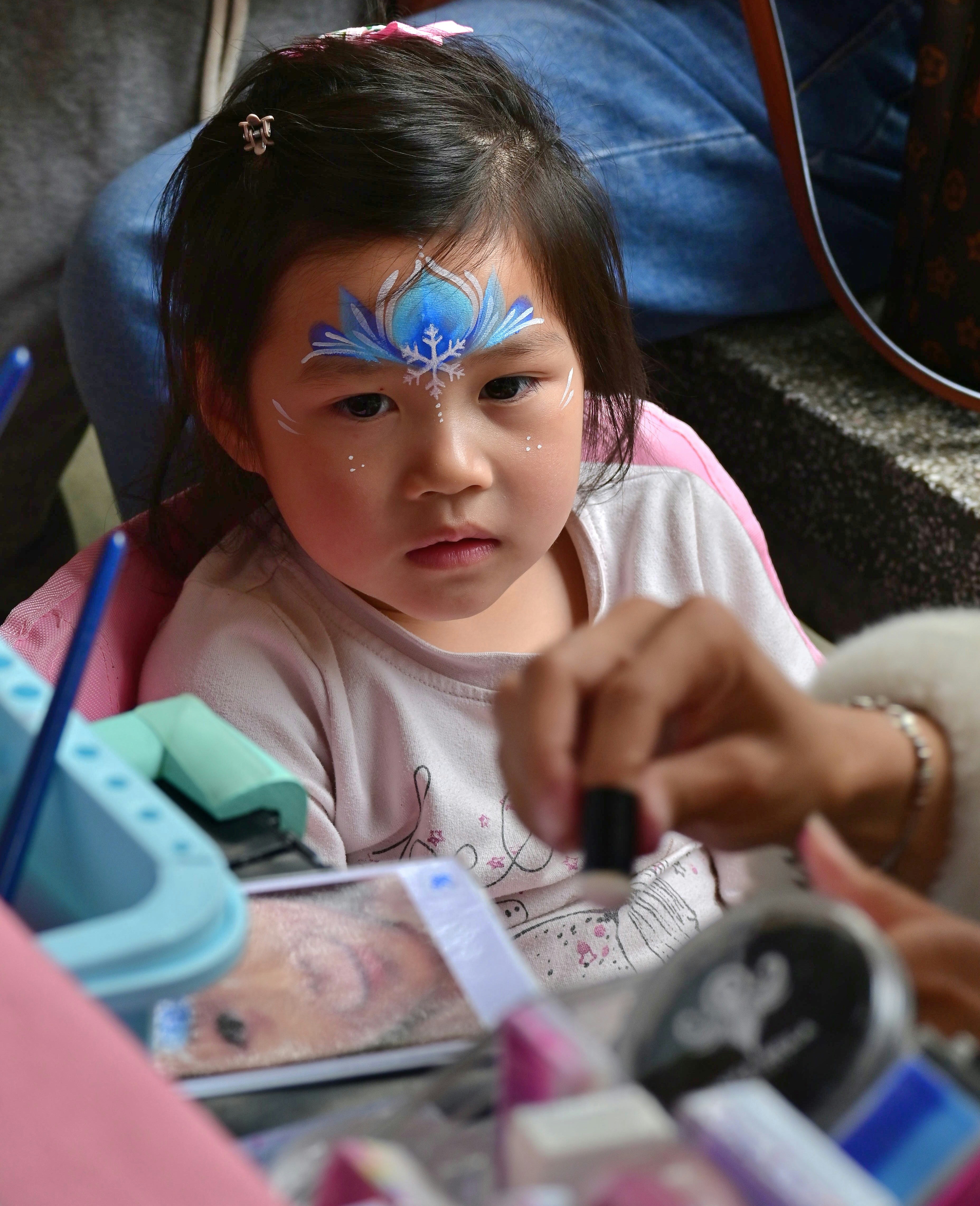 Winter Frost on Her Brow: A Quiet Moment at the Makeup Table