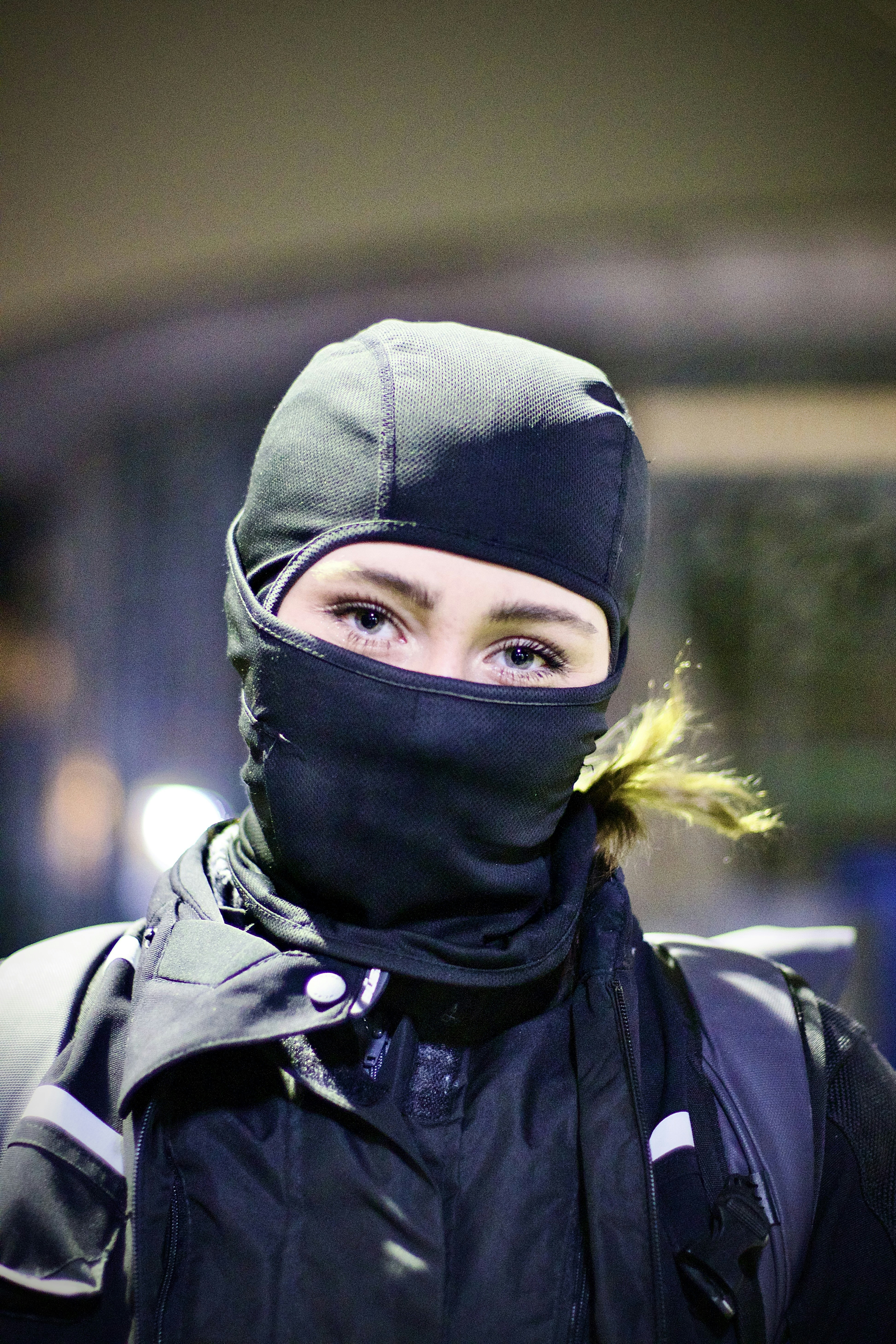 PEOPLE ARE BEAUTIFUL | A person in a balaclava looks at the camera.