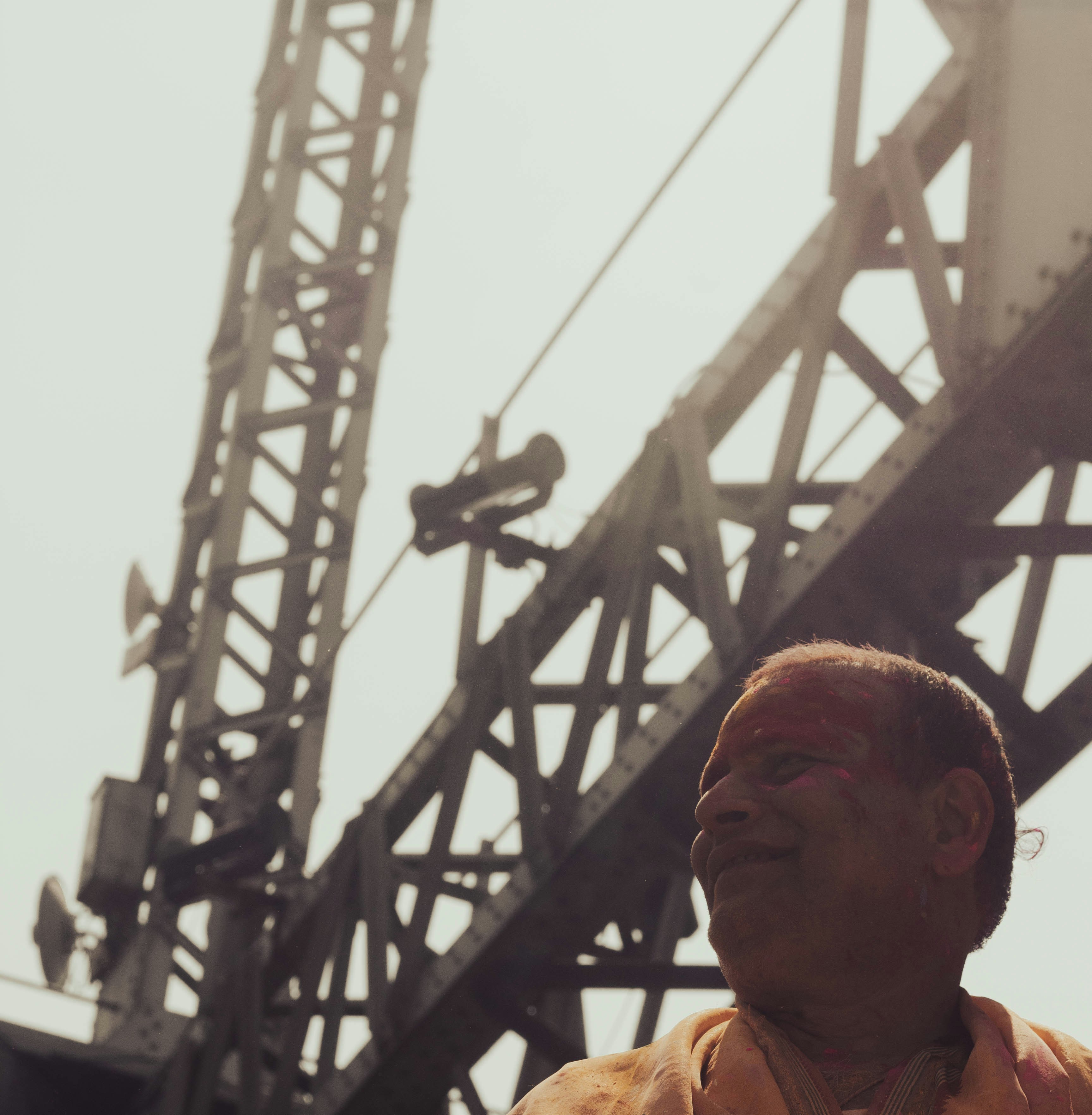 Riser’s Gaze: Focused Portrait Under Industrial Light