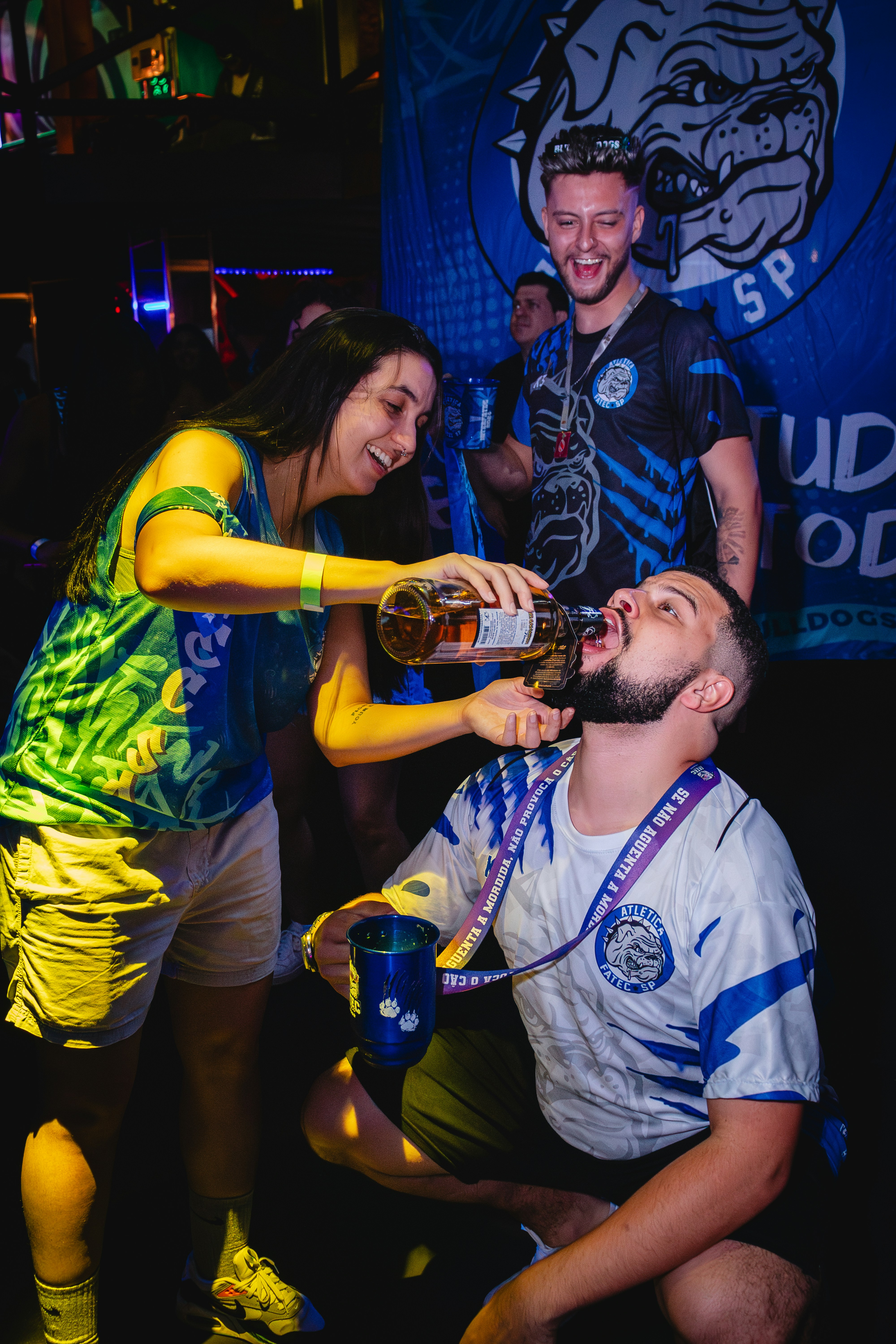 Cheer Amid the Cheer Squad: A Bottle Pour and Buddy Banter