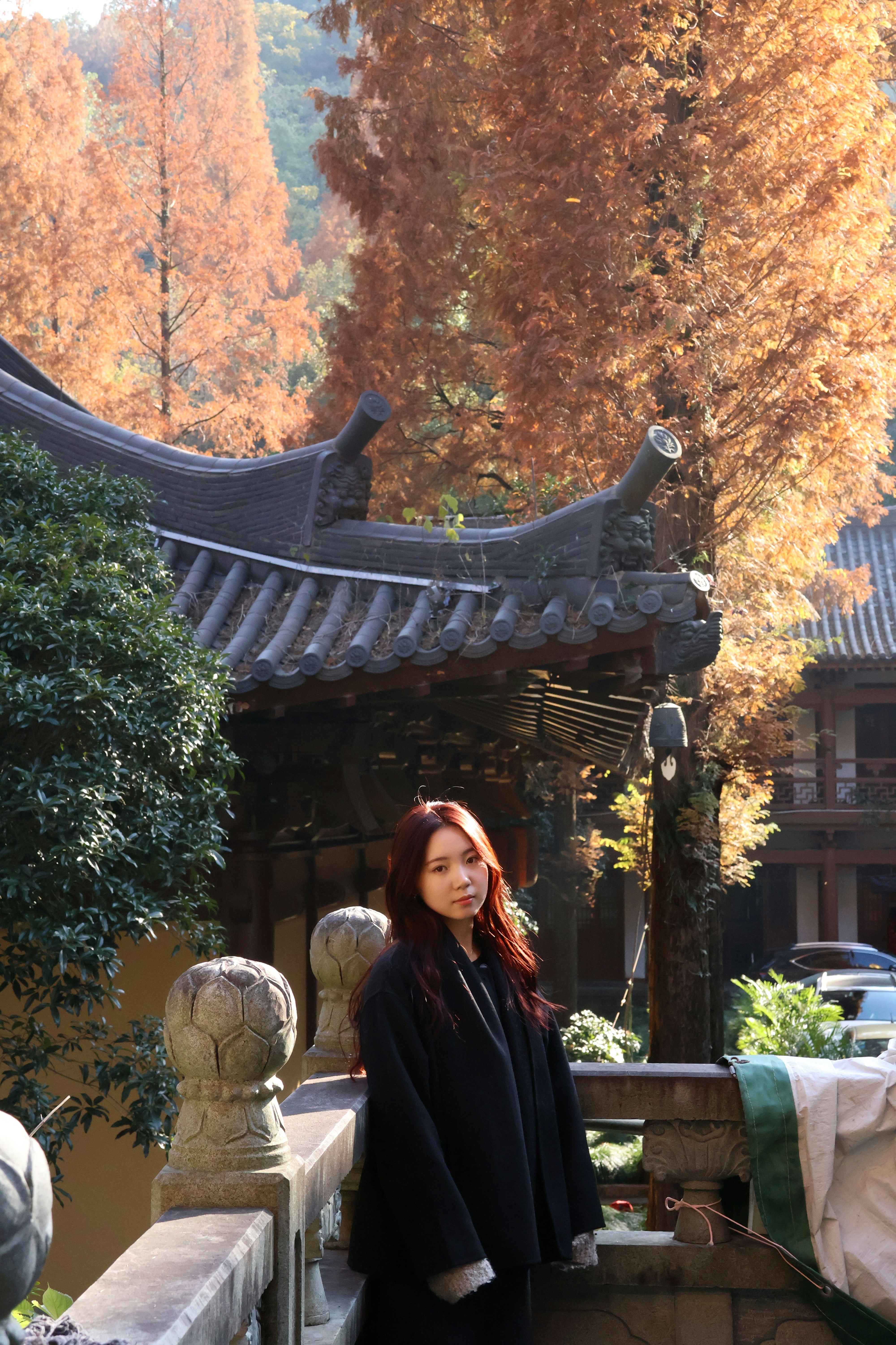 Autumn Courtyard Portrait Beneath Golden Foliage