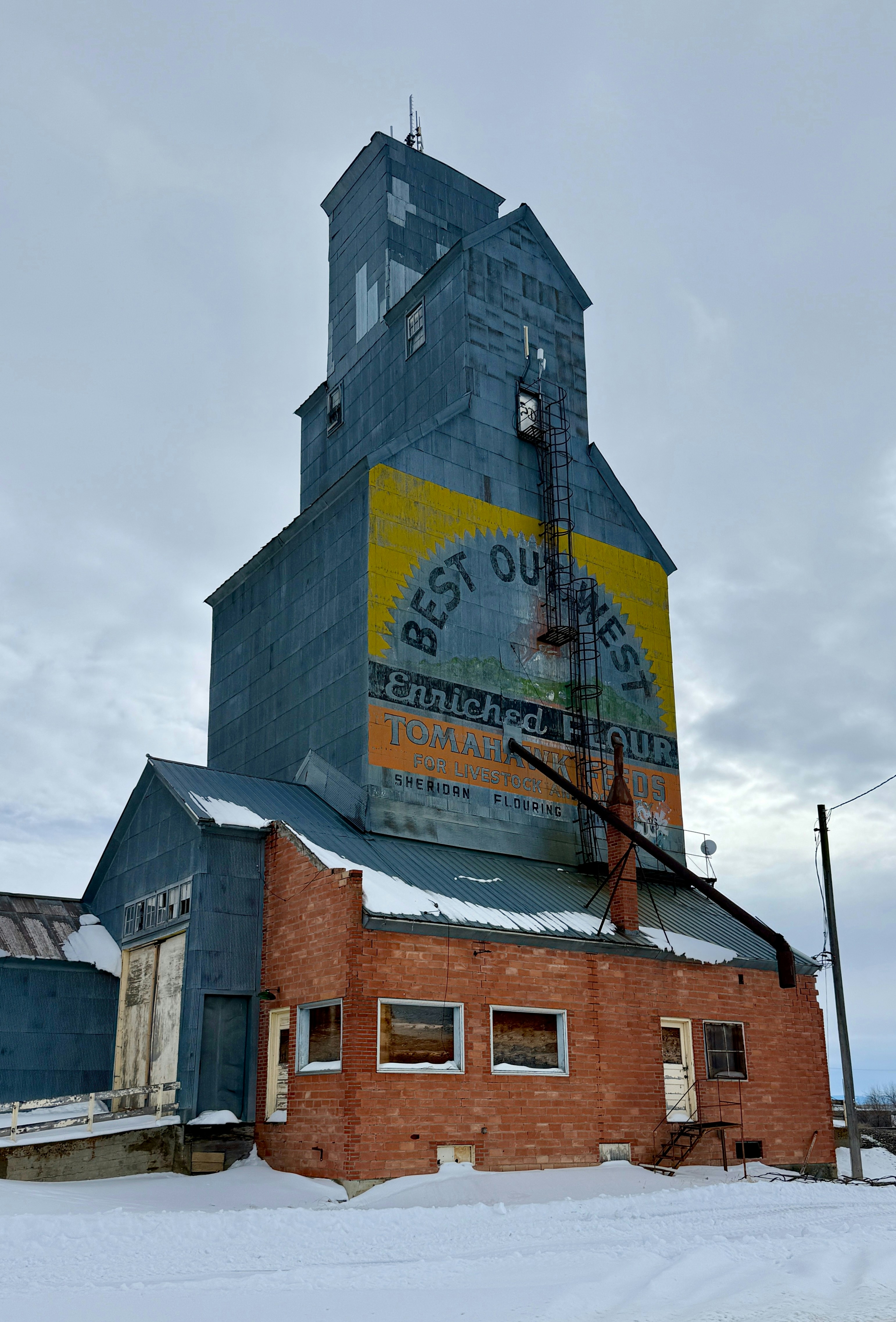 Old grain elevator building painted with "best out west." photo – Free ...