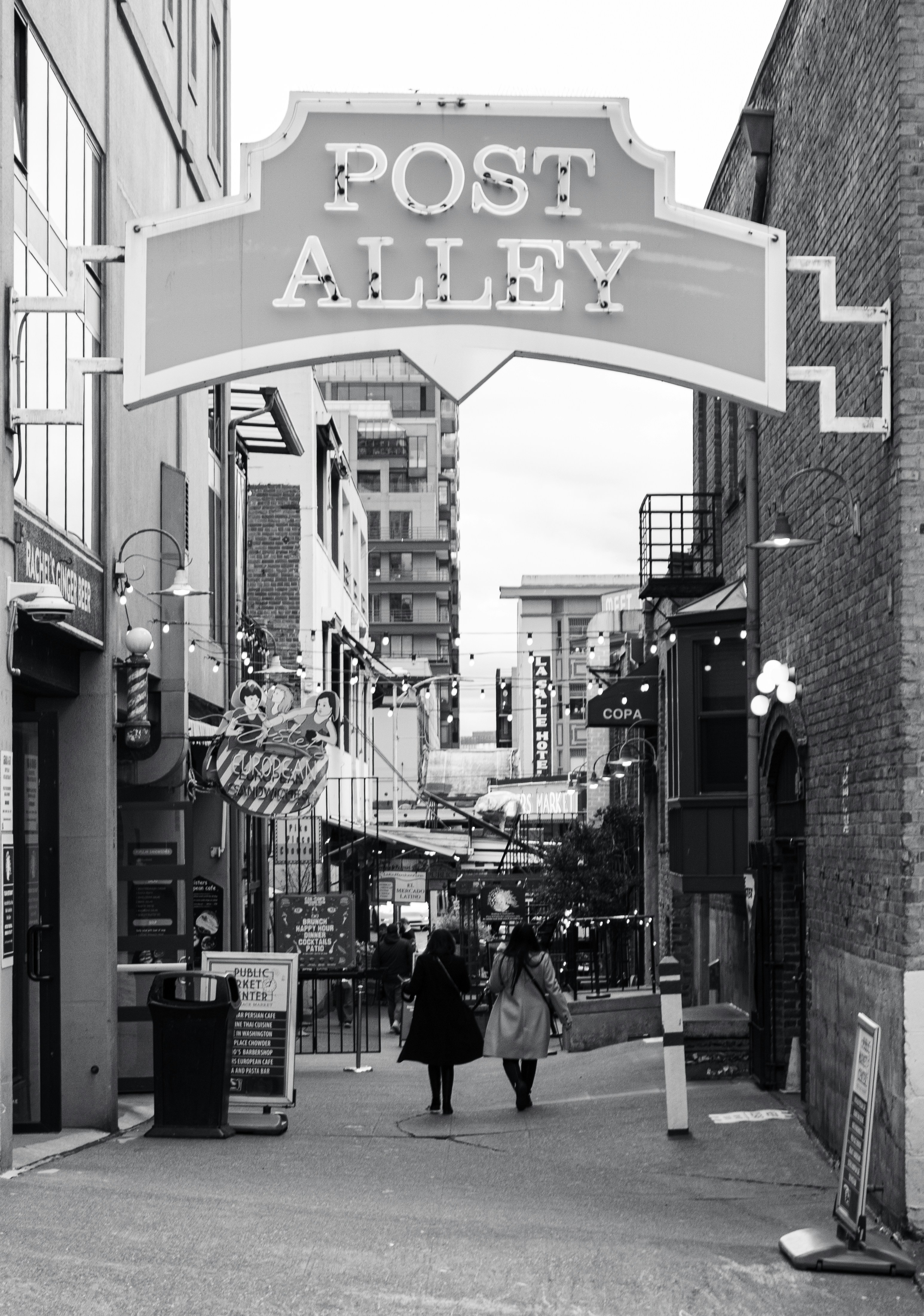Post Alley is a short street in Seattle. The northern end of the street runs under and through Pike Place Market. The alley is mostly paved with bricks.