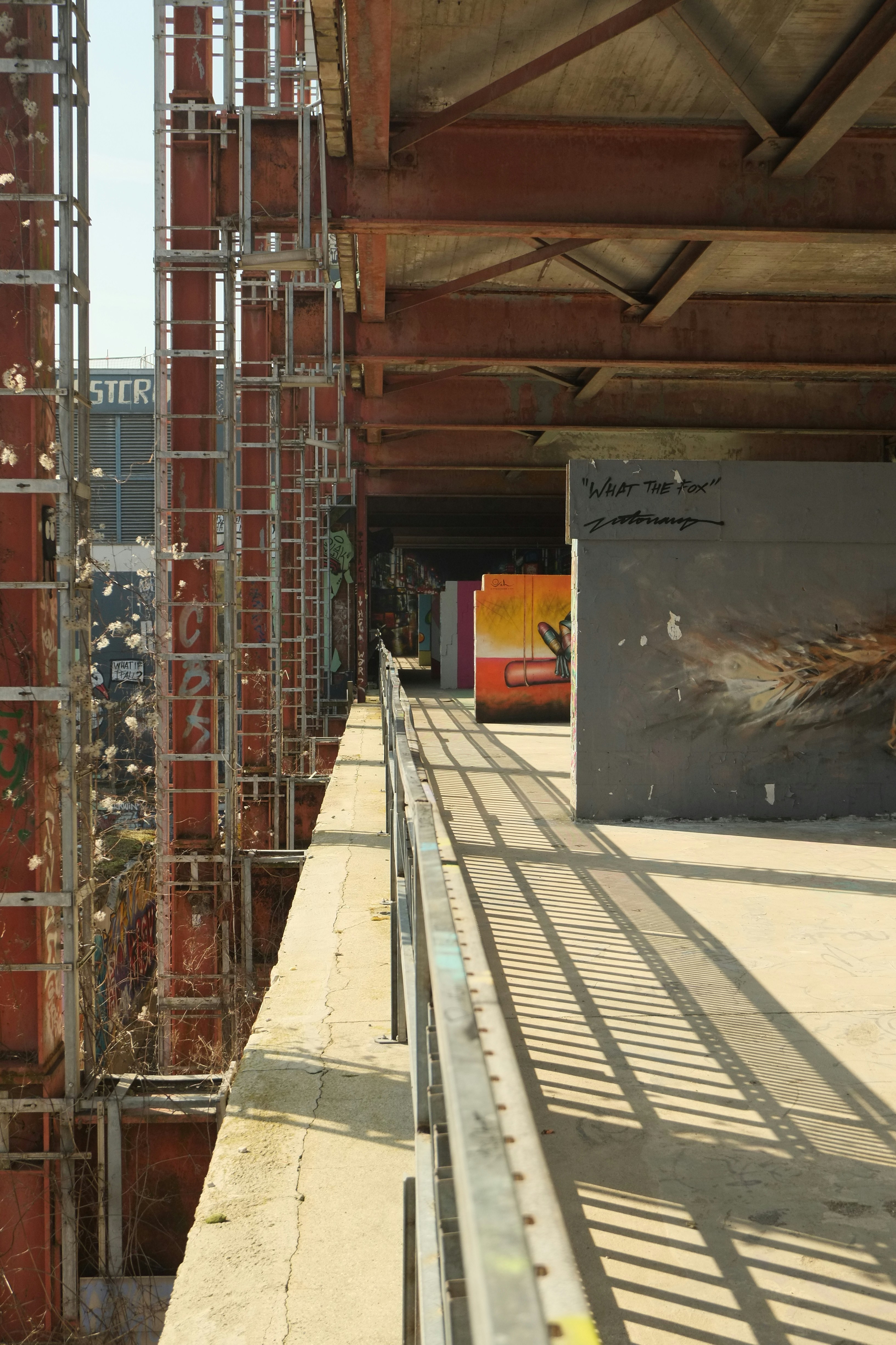 Rusted Rails and Sunlit Gaps: A Corridor Under Construction