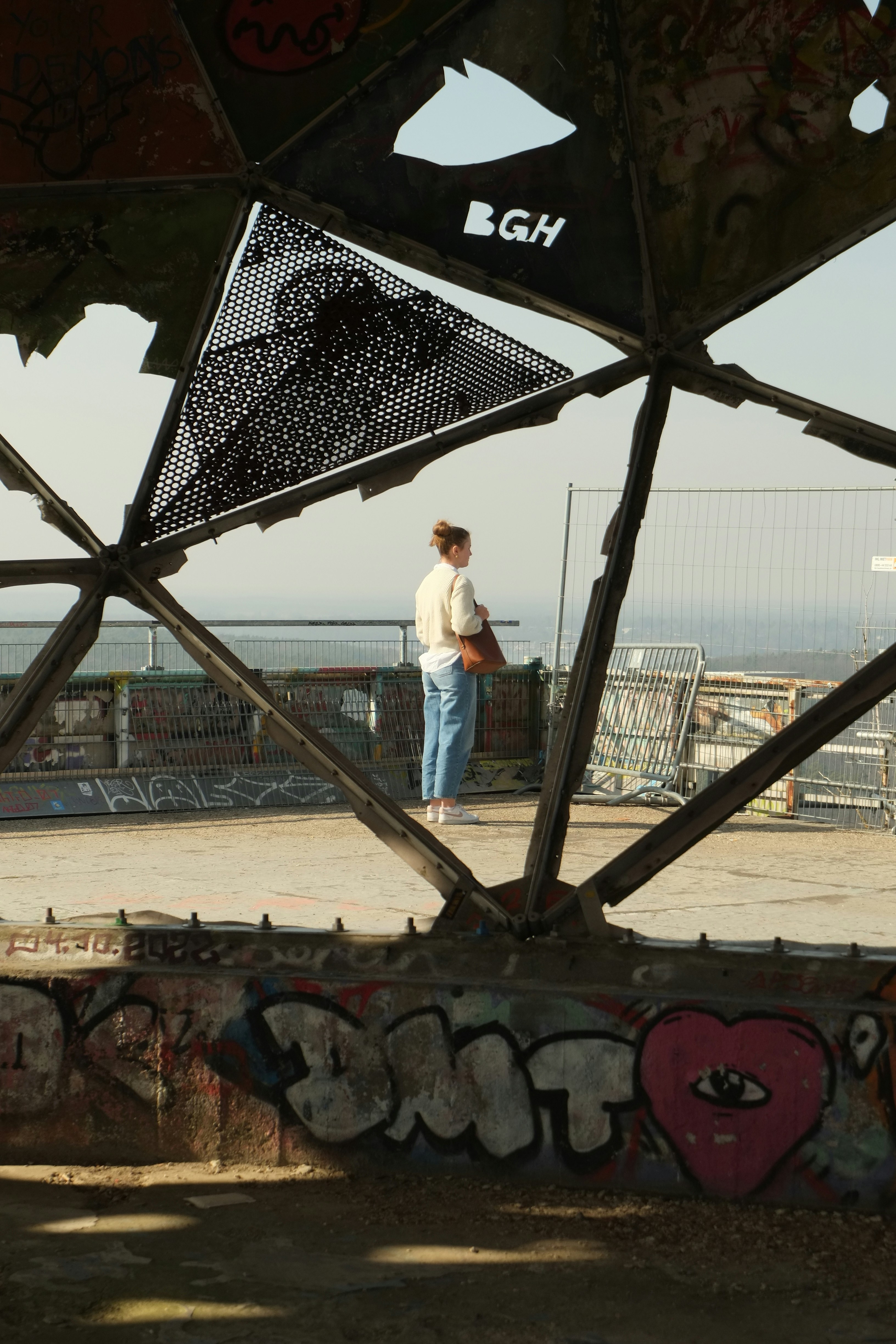 Glimpse Through a Polygonal Frame: A Quiet Figure by the Sea