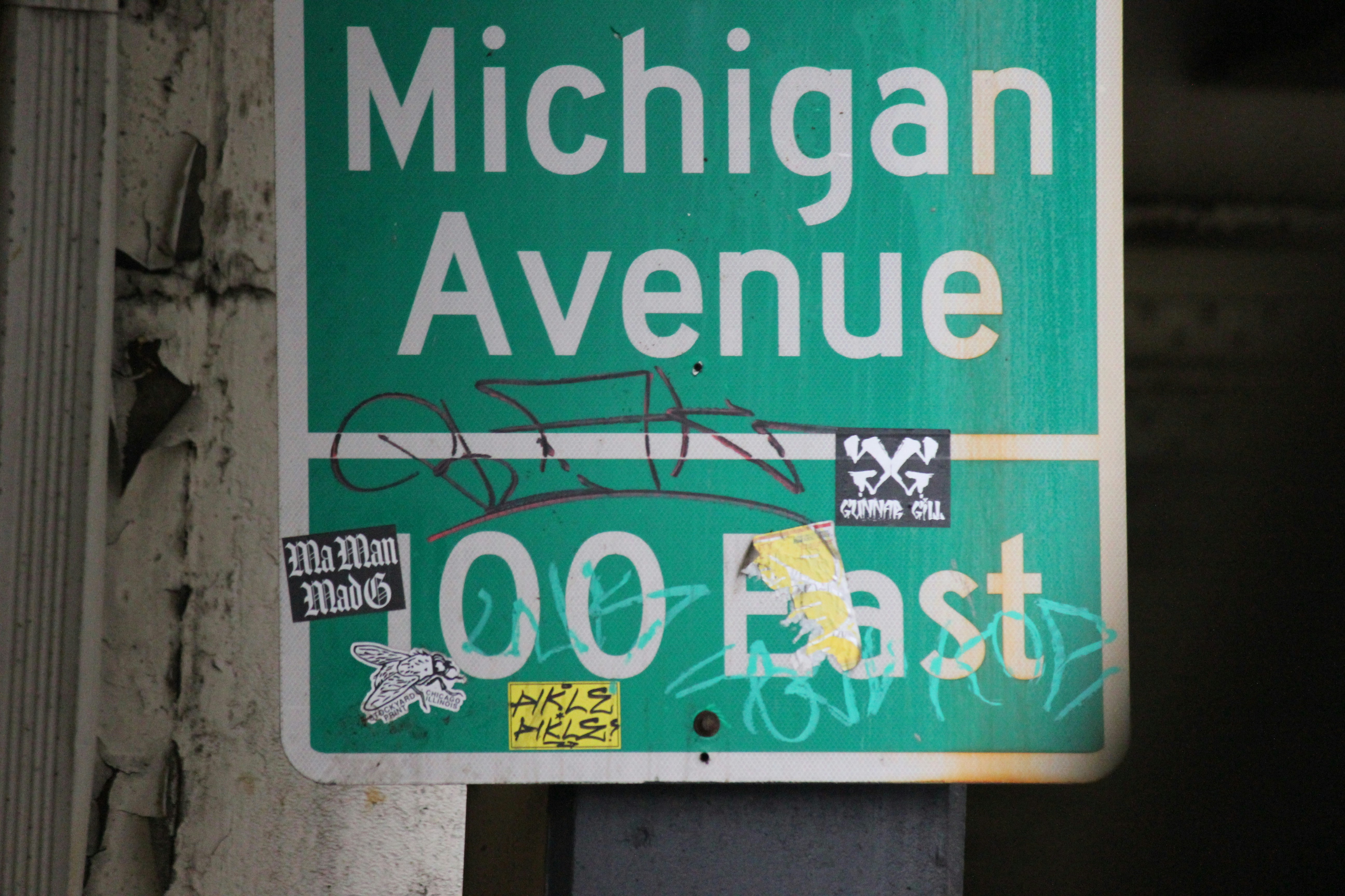 Michigan avenue sign with graffiti and stickers. photo – Free Text ...