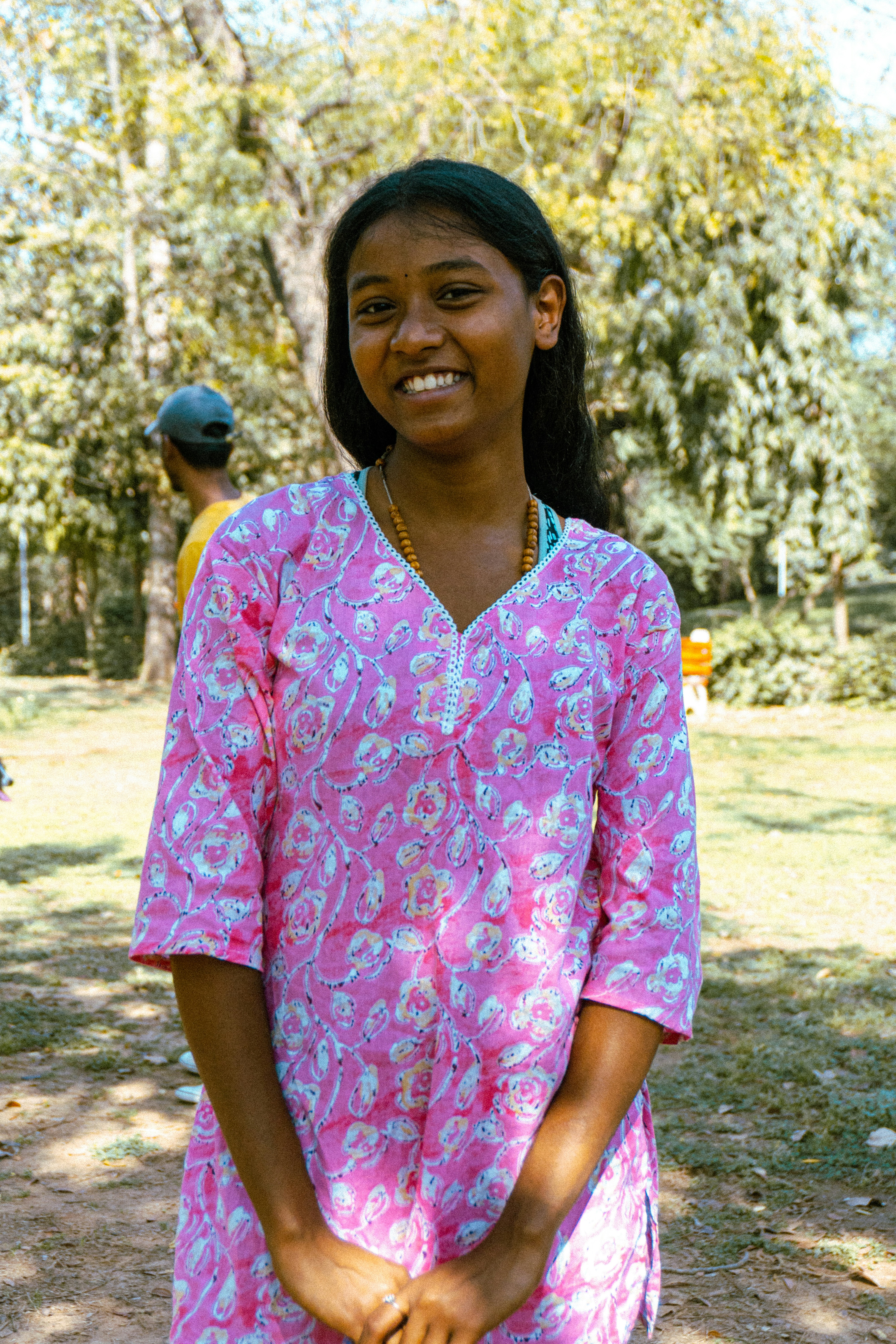 Portrait in a Park: Bright Pink Kurti and a Warm Smile