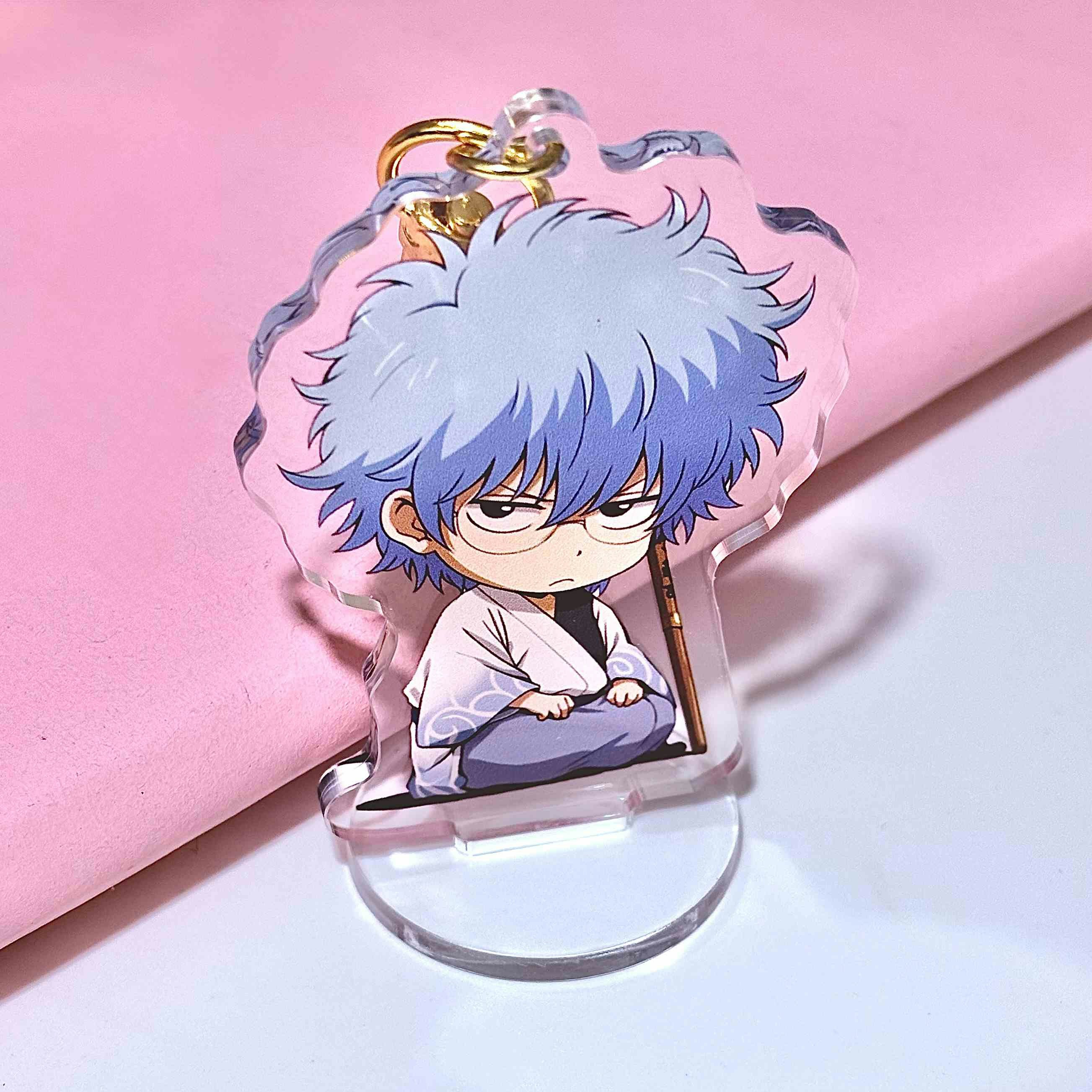 Anime character keychain with a stand. photo – Free Anime Image on Unsplash