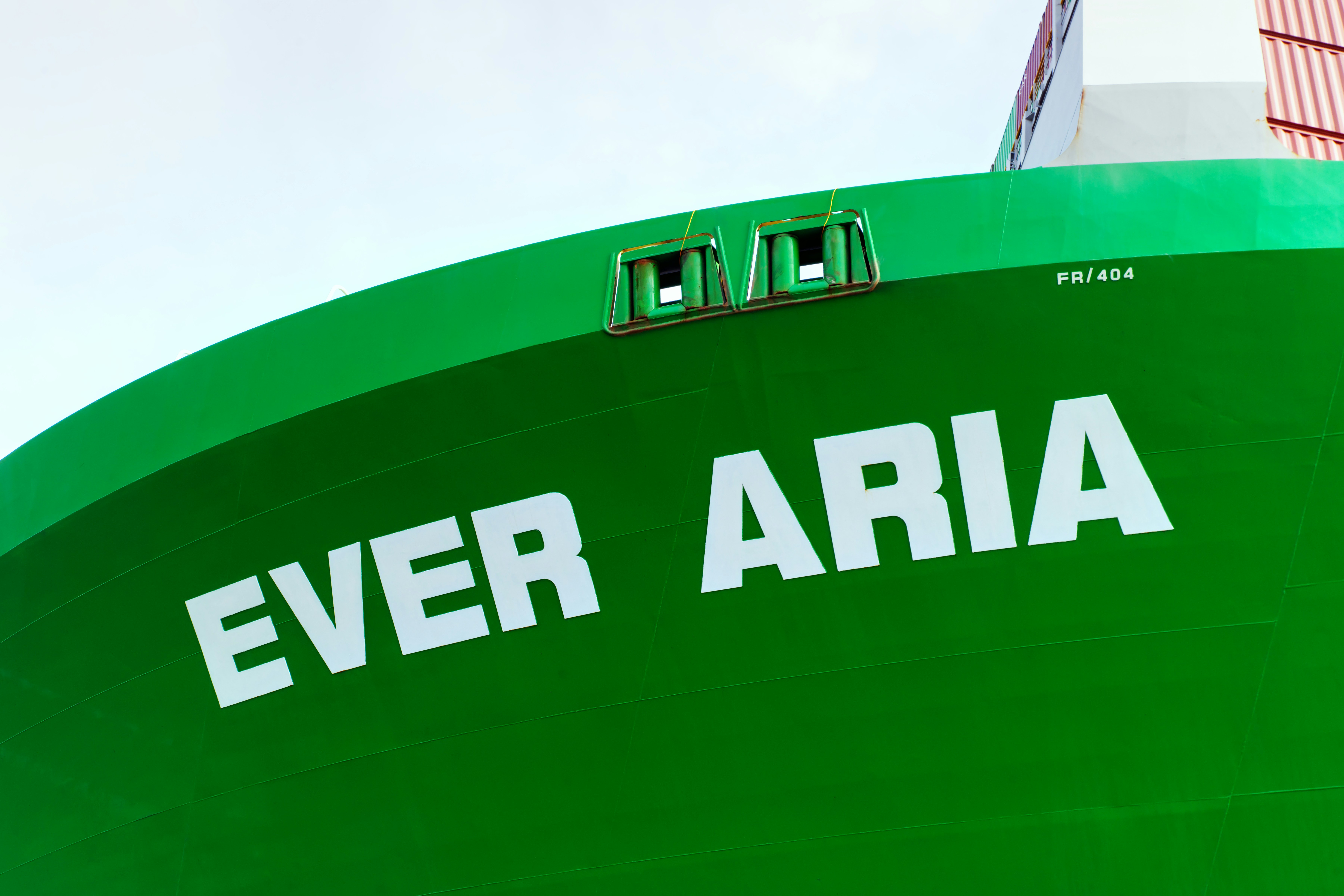 The green hull of the "ever aria" ship. photo – Free Cargo ship Image ...