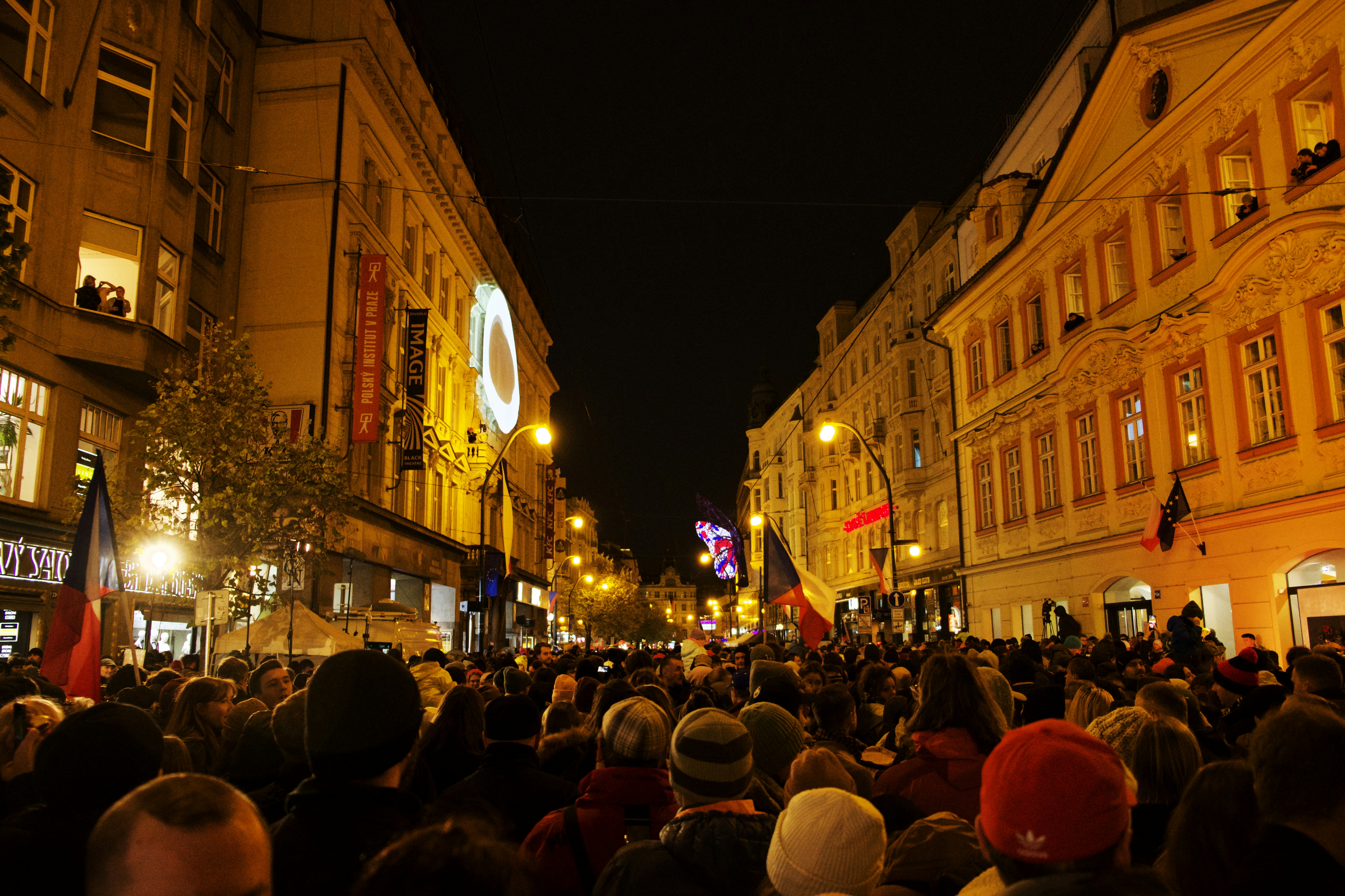 Night Parade through a Historic City Street